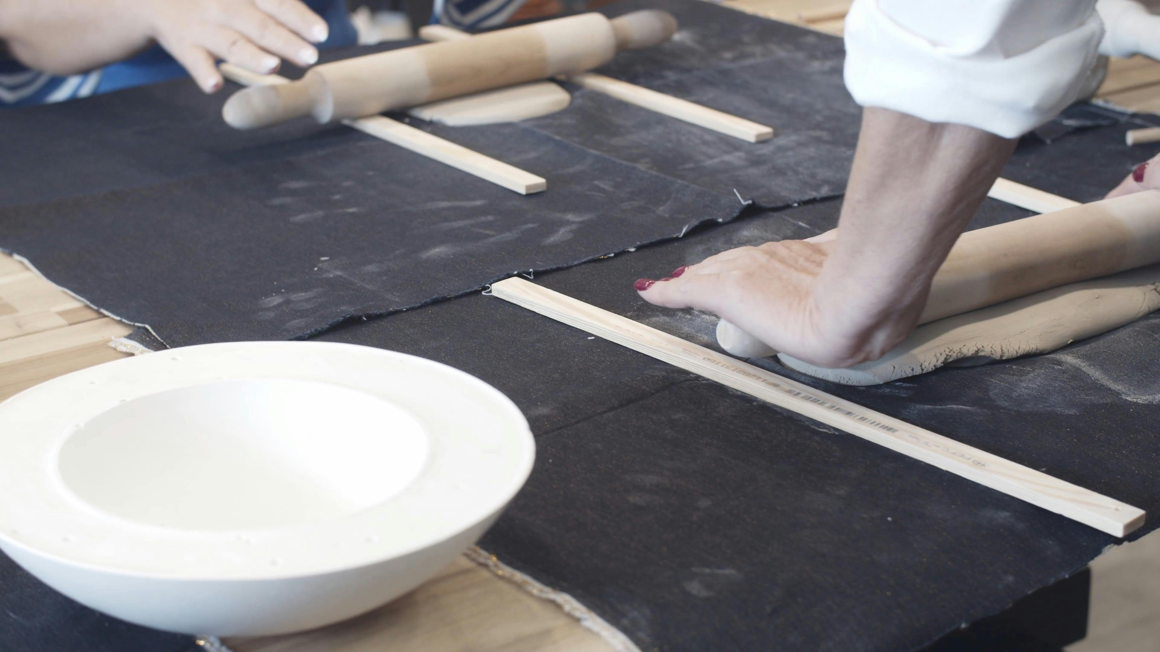 Using Rolling Pin to Mold Flatten Clay Free Stock Video Footage ...