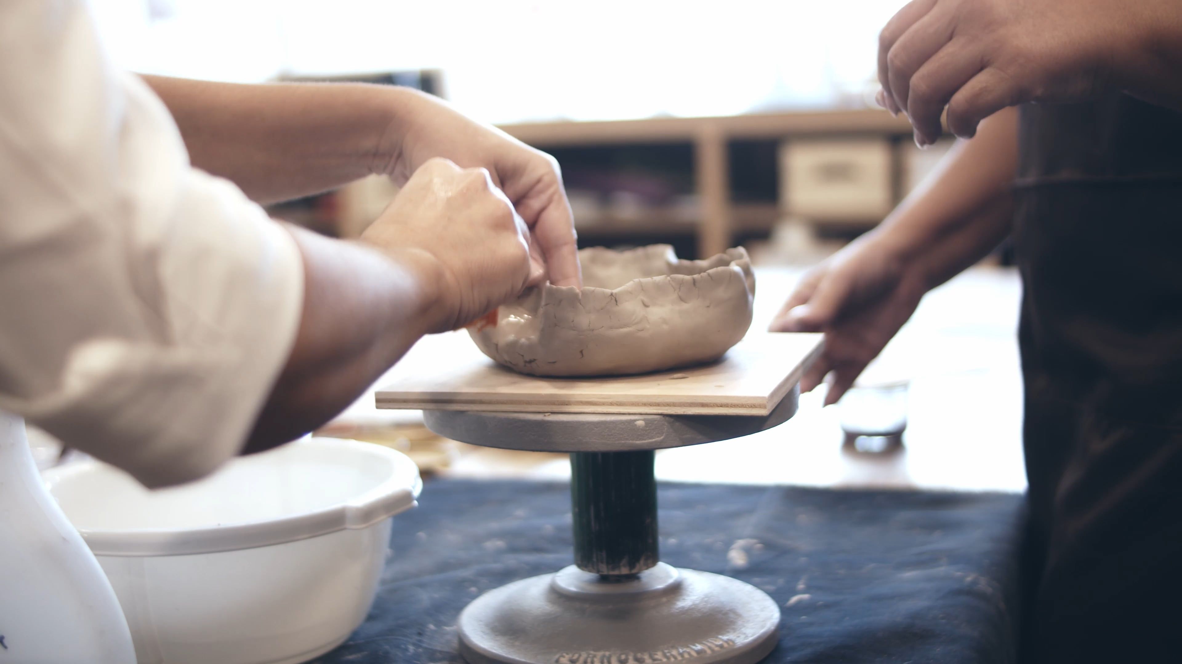 People in a Pottery Workshop · Free Stock Video