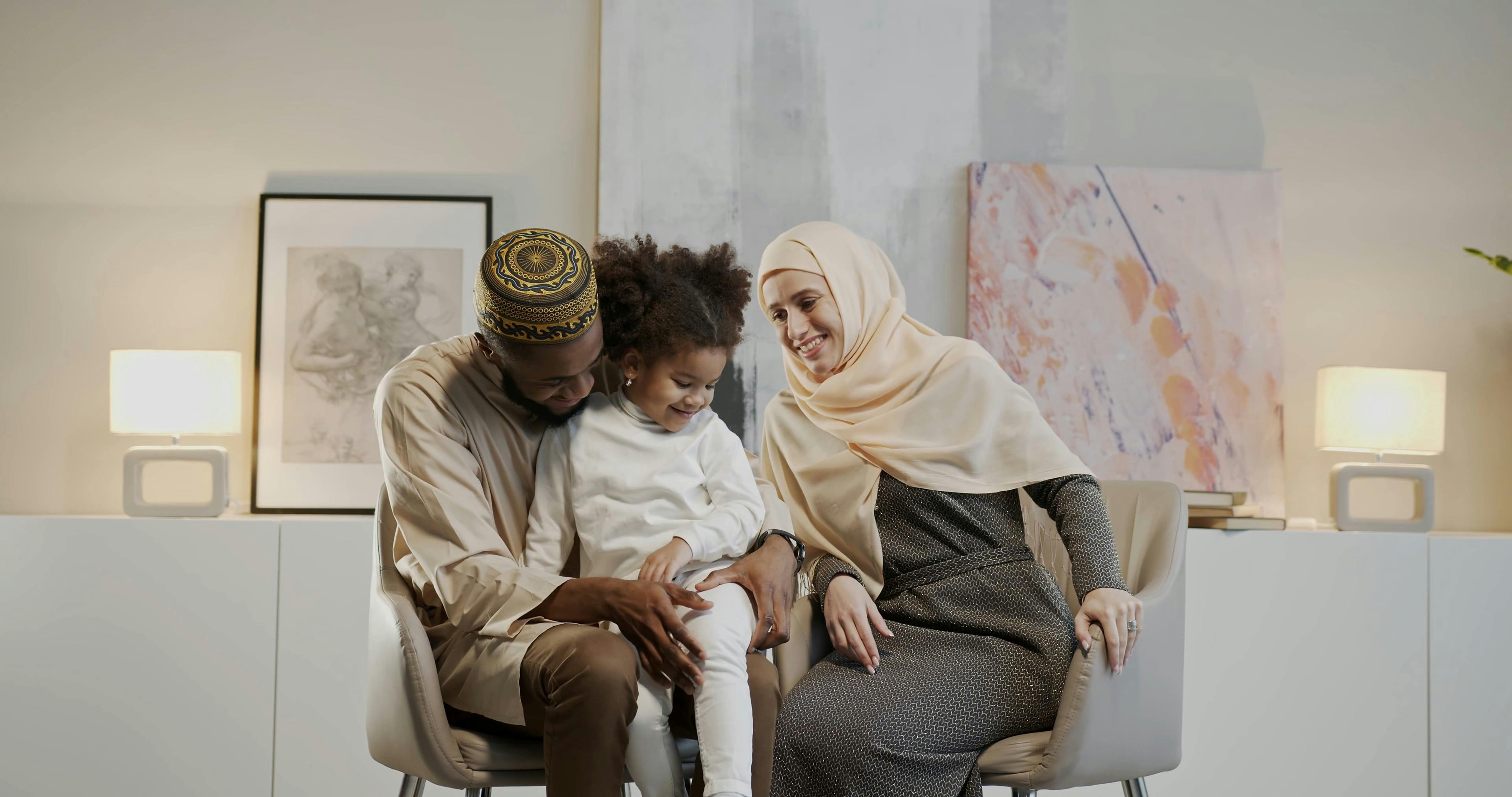 A Muslim Family Sitting and Talking in the Living Room · Free Stock Video