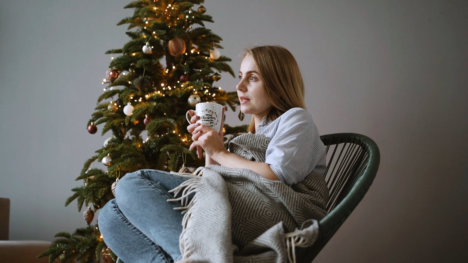 Woman Sitting Beside a Christmas Tree Free Stock Video Footage, Royalty ...