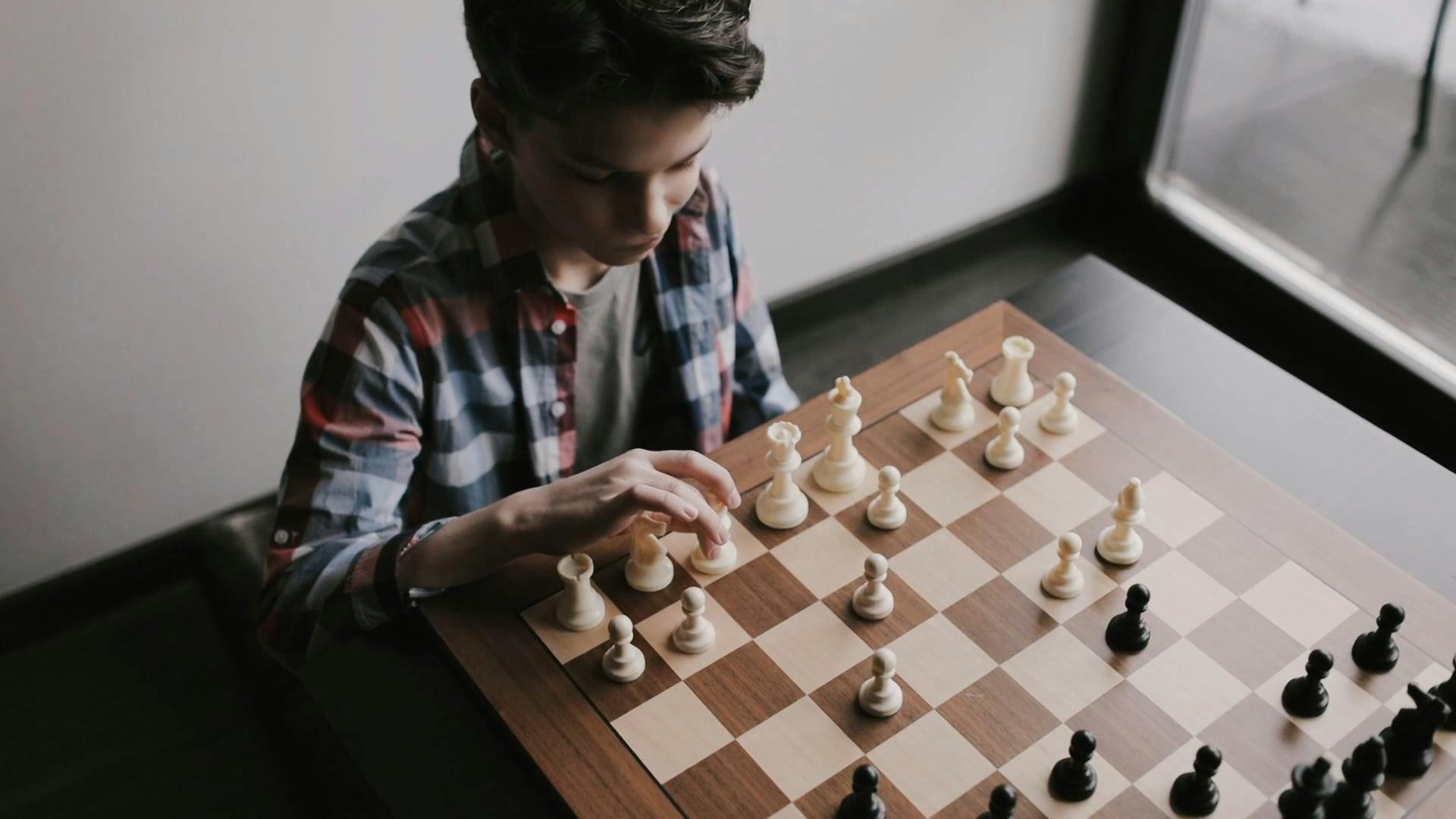 A Person Moving a Chess Piece on the Board Free Stock Video Footage ...