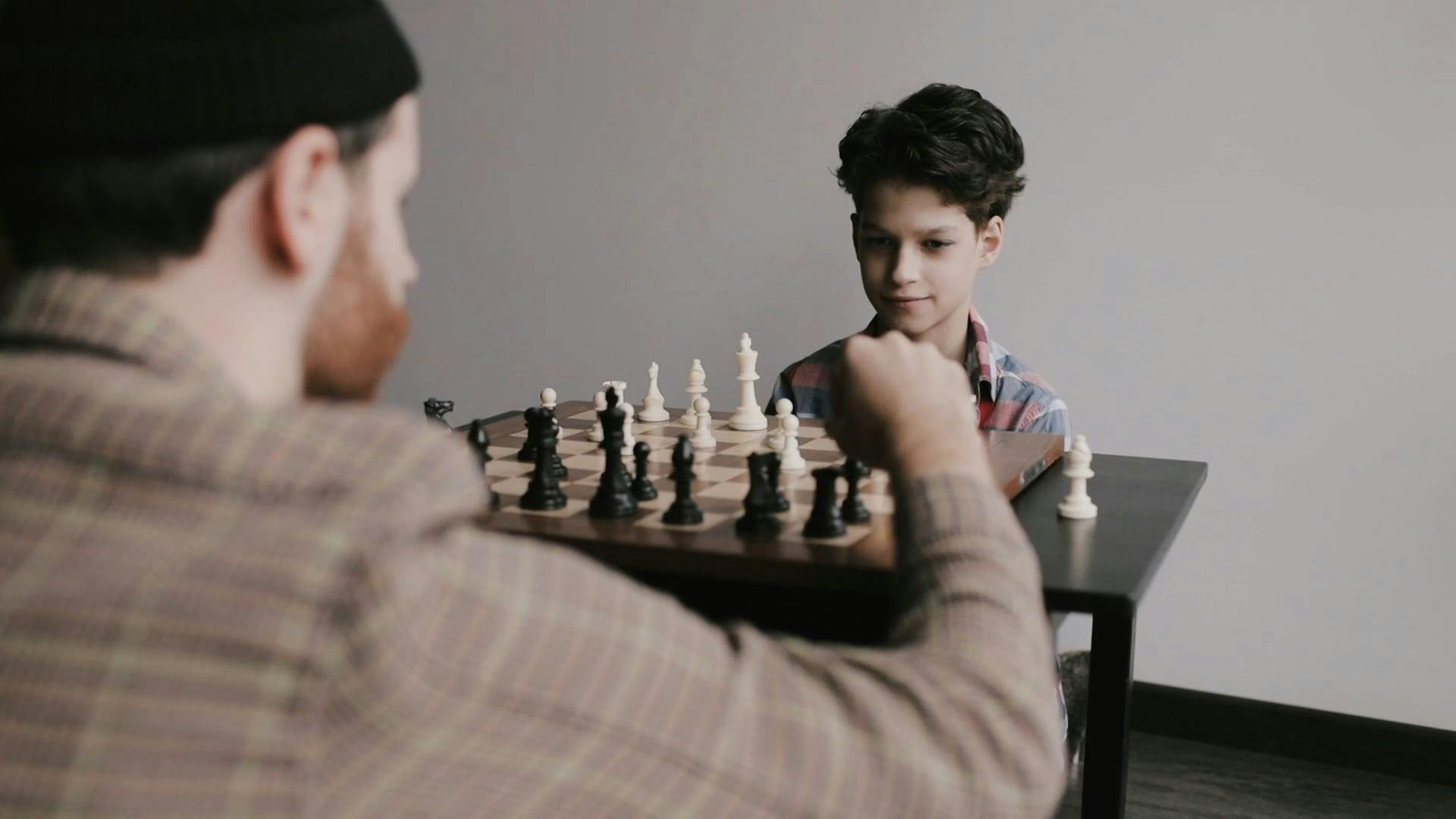 A Person Moving a Chess Piece on the Board Free Stock Video Footage ...