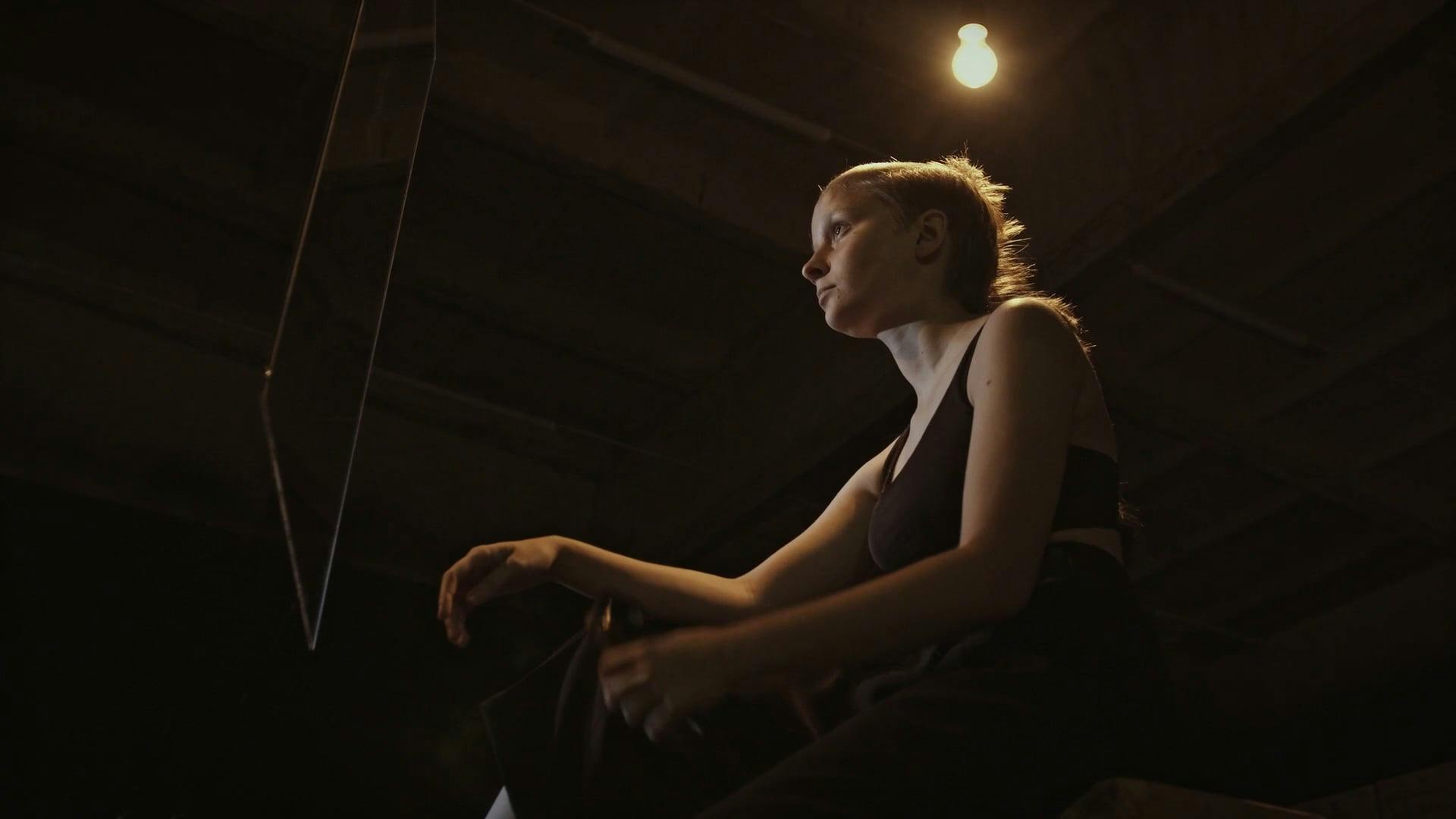 Woman Using Shaving Her Head Using a Razor · Free Stock Video