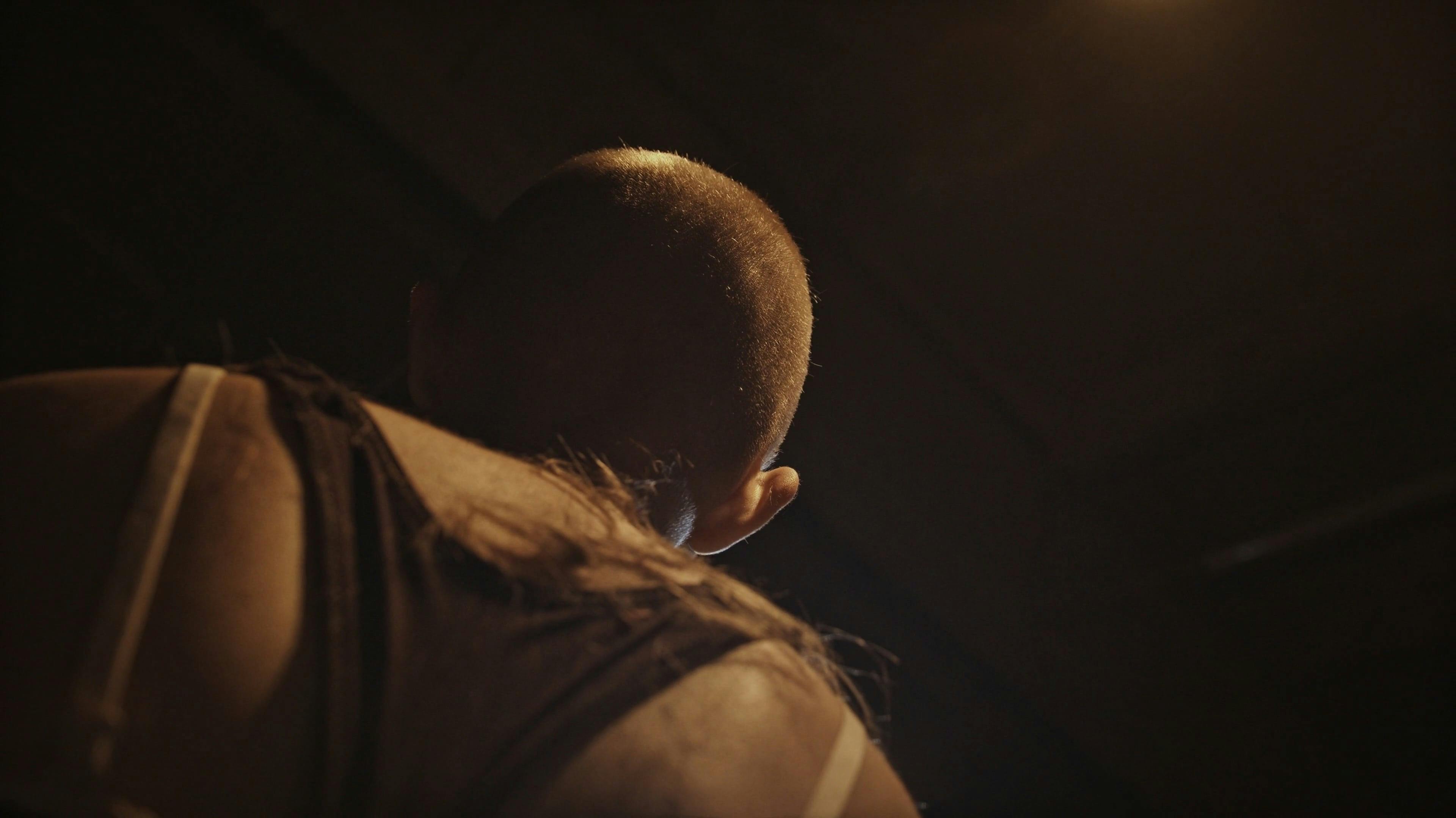 A Person Cutting Own Hair using a Razor · Free Stock Video