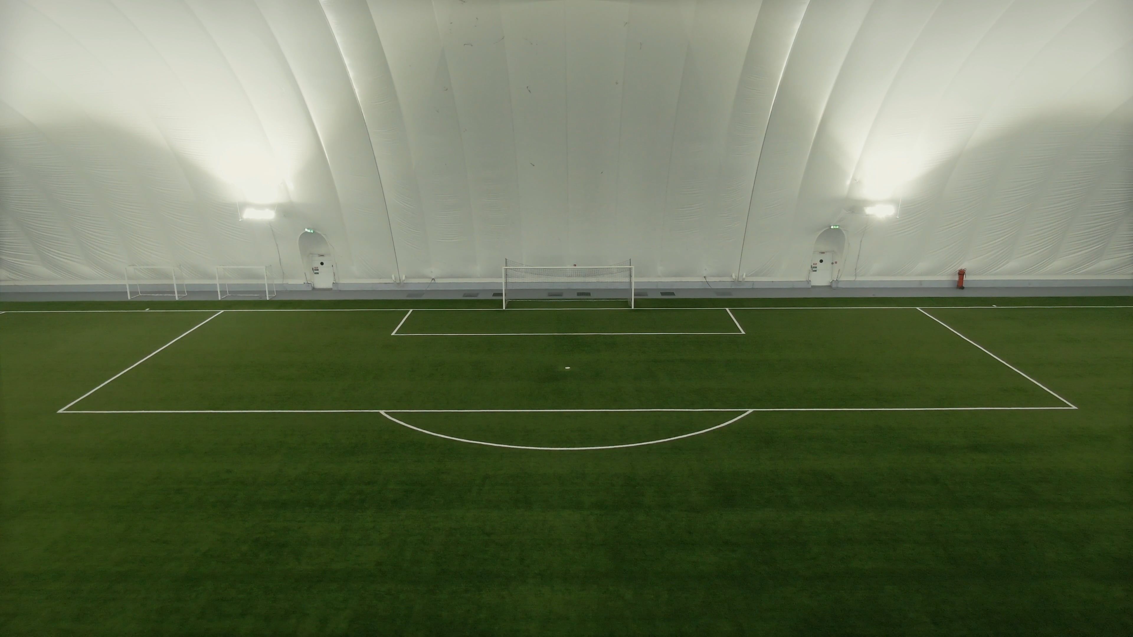 Drone Footage of an Indoor Football Field · Free Stock Video