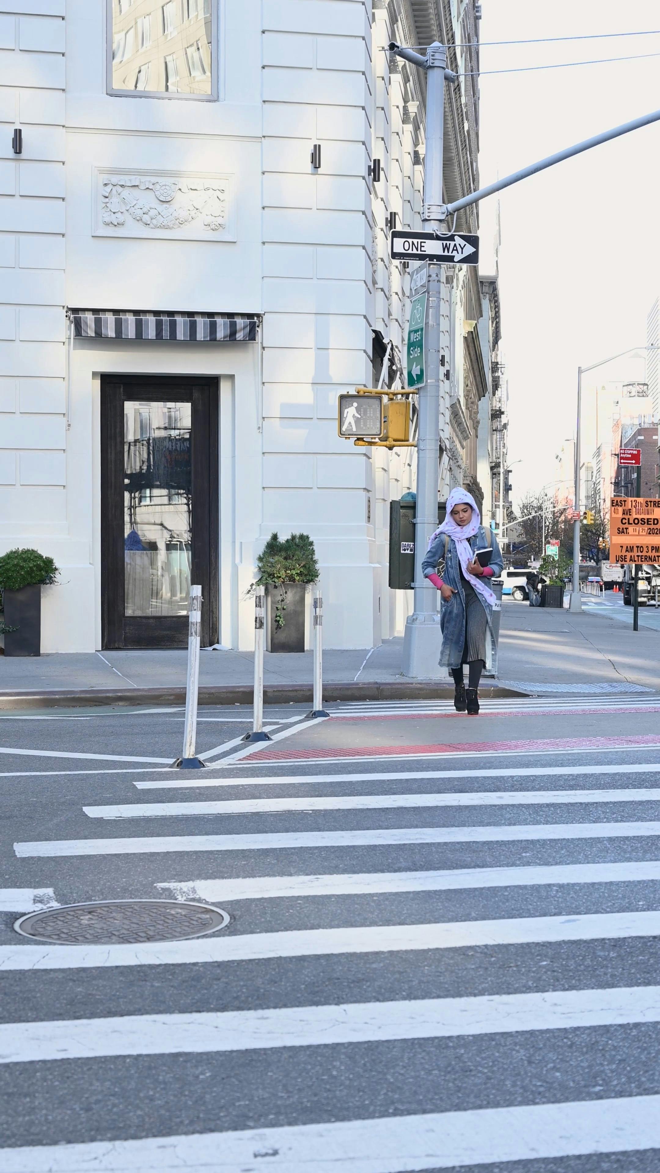 A Woman Crossing the Pedestrian Lane · Free Stock Video
