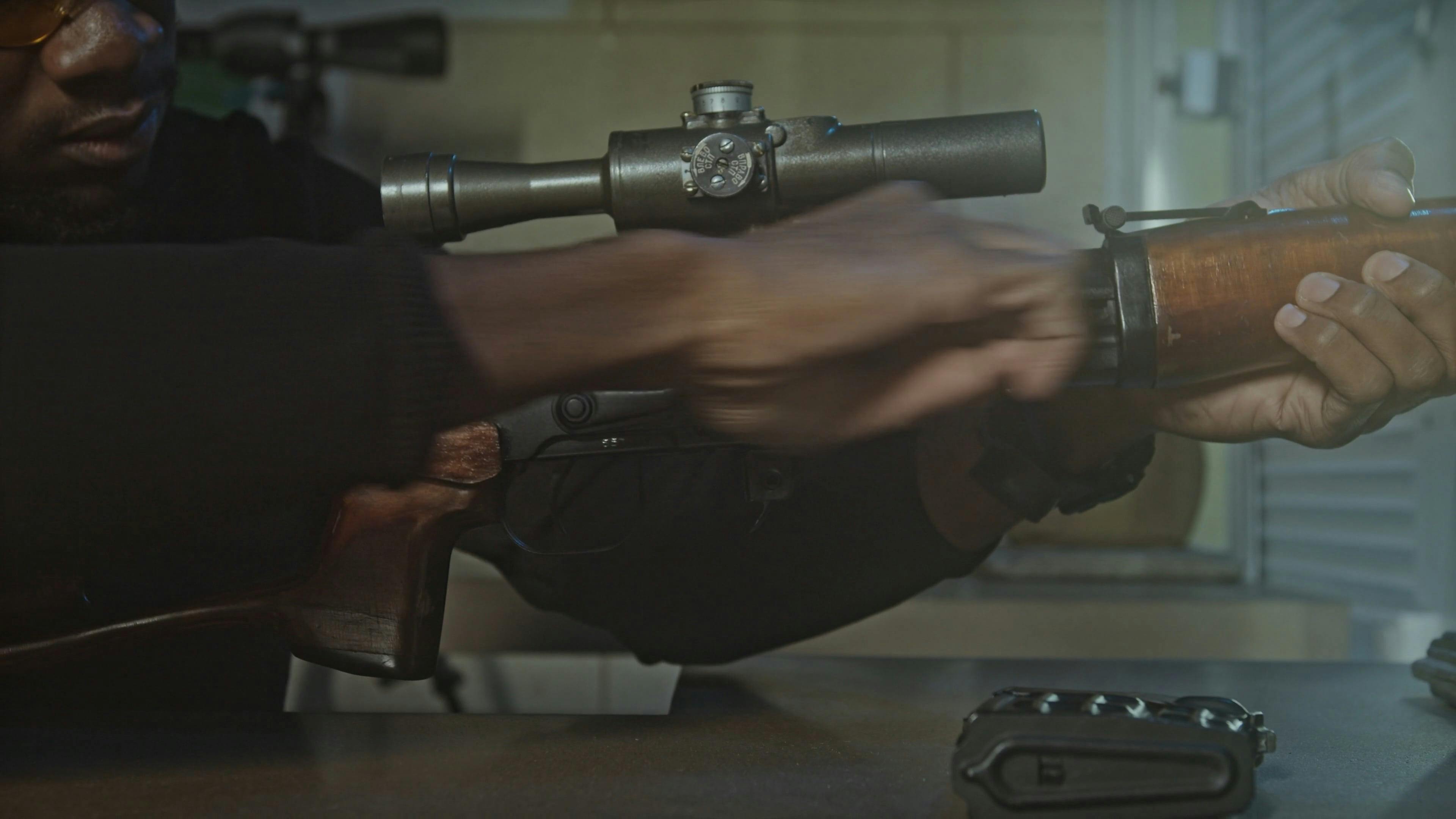 Man Holding a Sniper Rifle · Free Stock Video