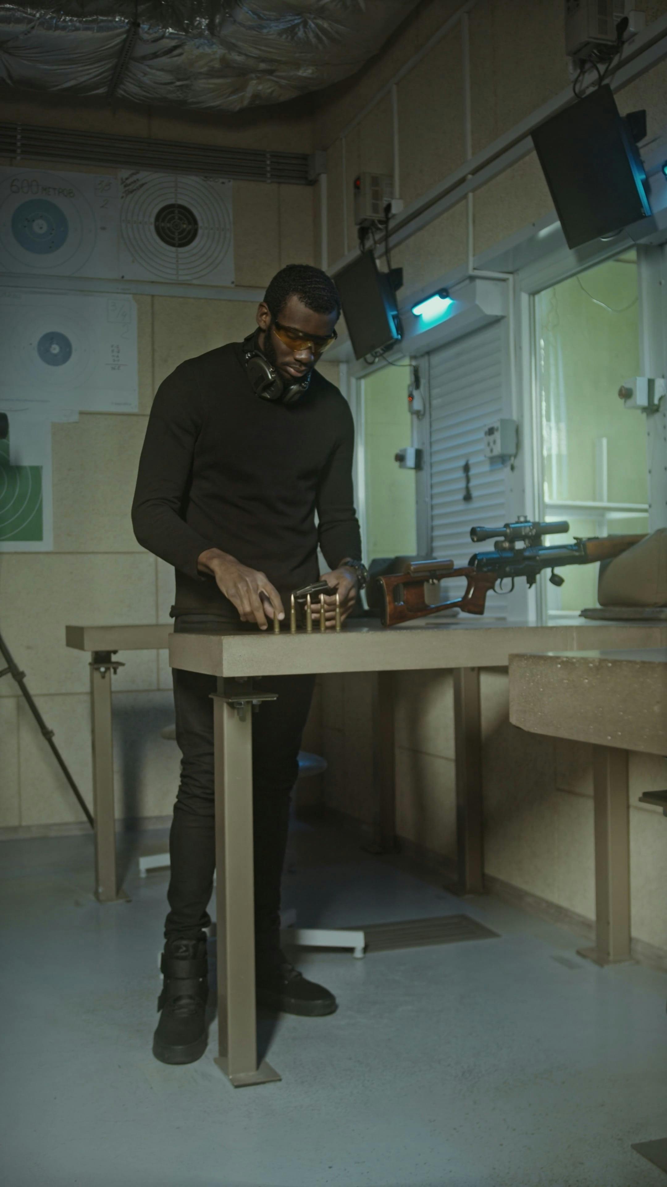 Man Reloading a Sniper Rifle Magazine Free Stock Video Footage, Royalty ...