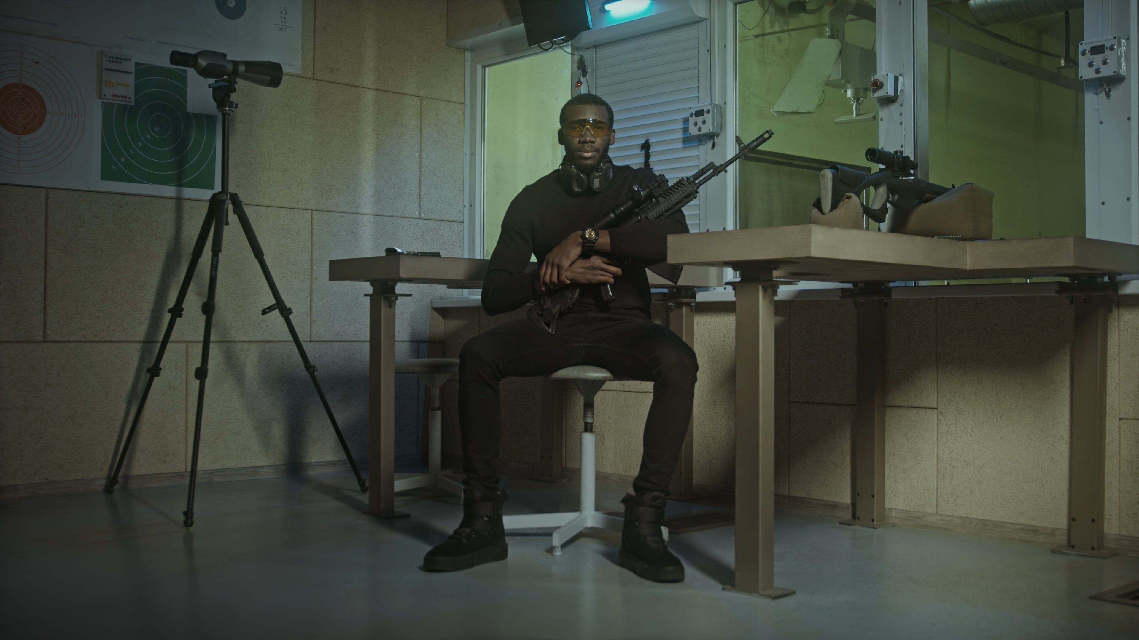 Man Holding a Rifle while Sitting at a Gun Range Free Stock Video ...