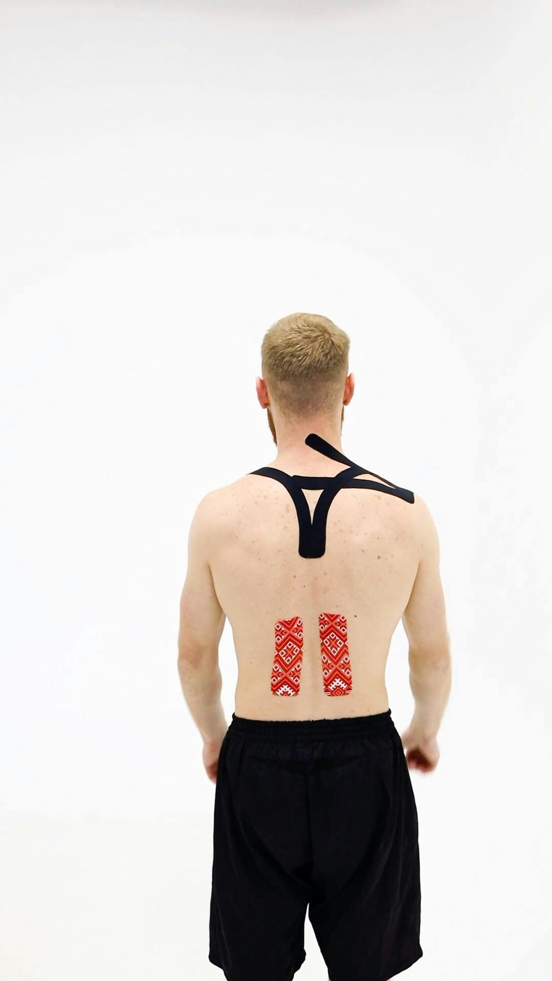 Man with Kinesio Tape on His Back Stretching · Free Stock Video