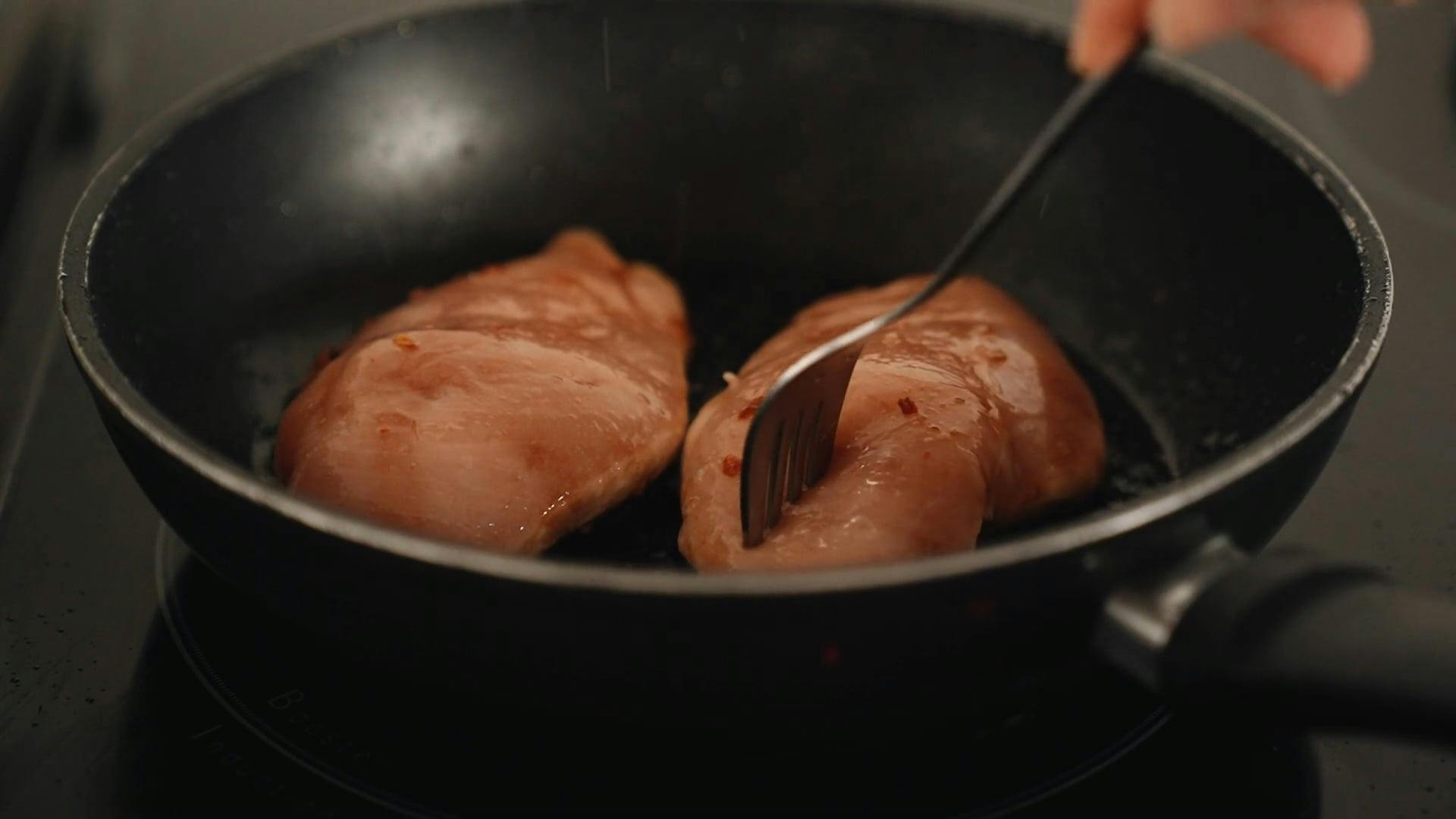Close Up Video of a Person Frying Chicken Meat · Free Stock Video