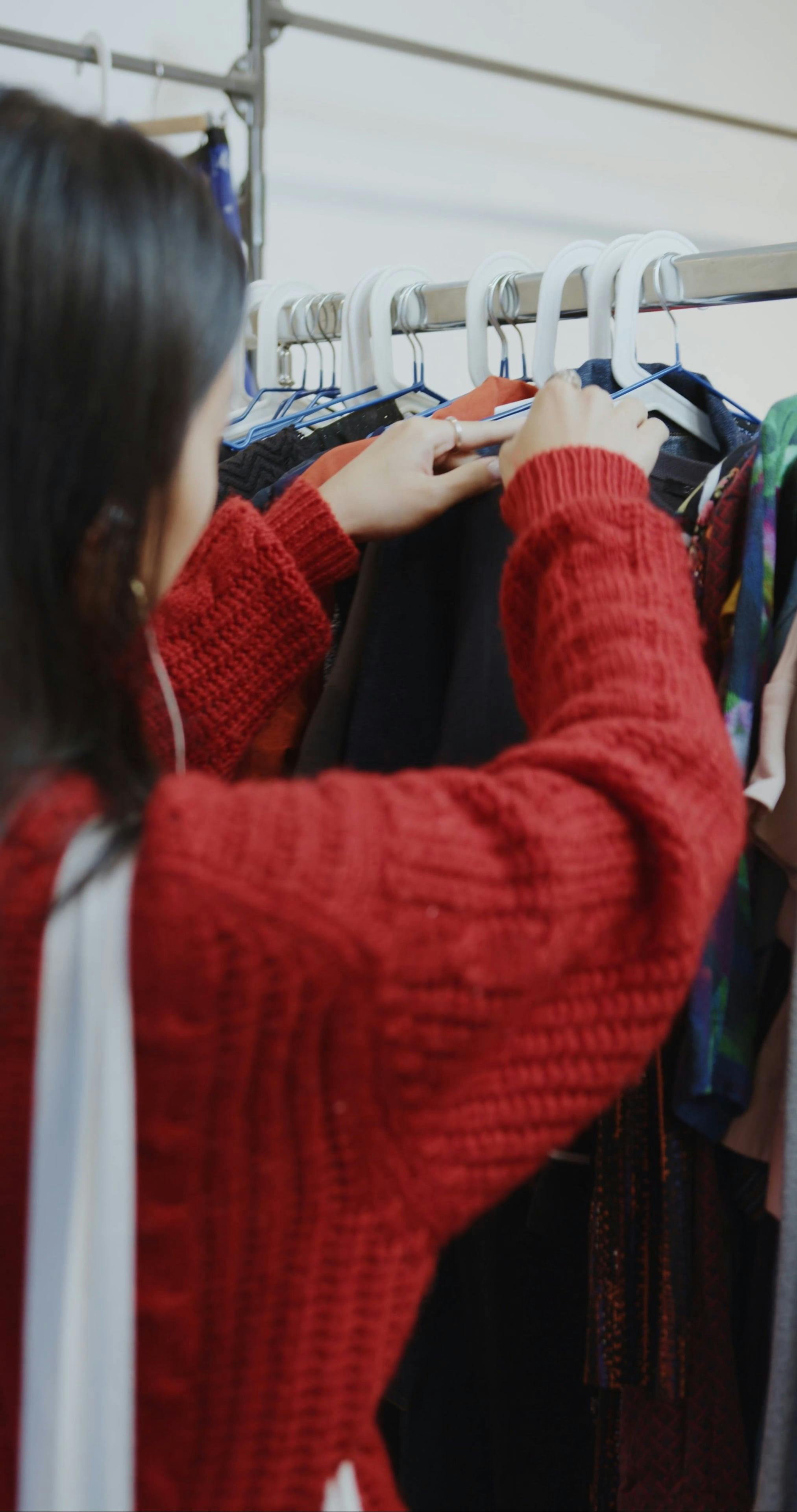 Woman Picking Clothes in the Store · Free Stock Video