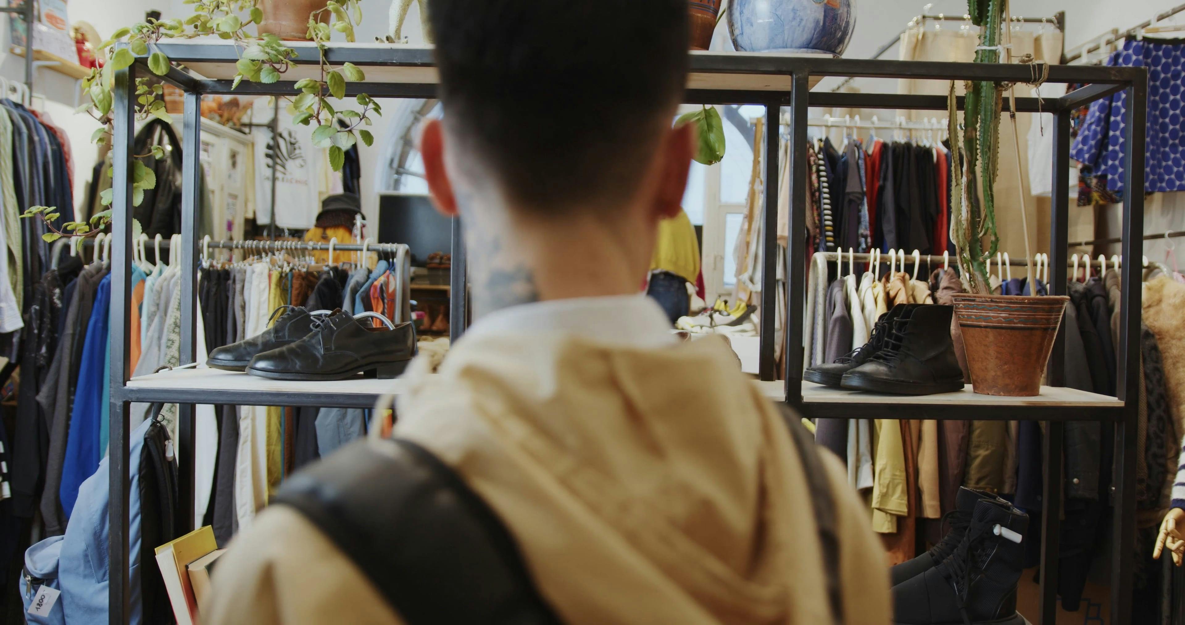 People Looking at the Items on a Clothing Store Free Stock Video ...