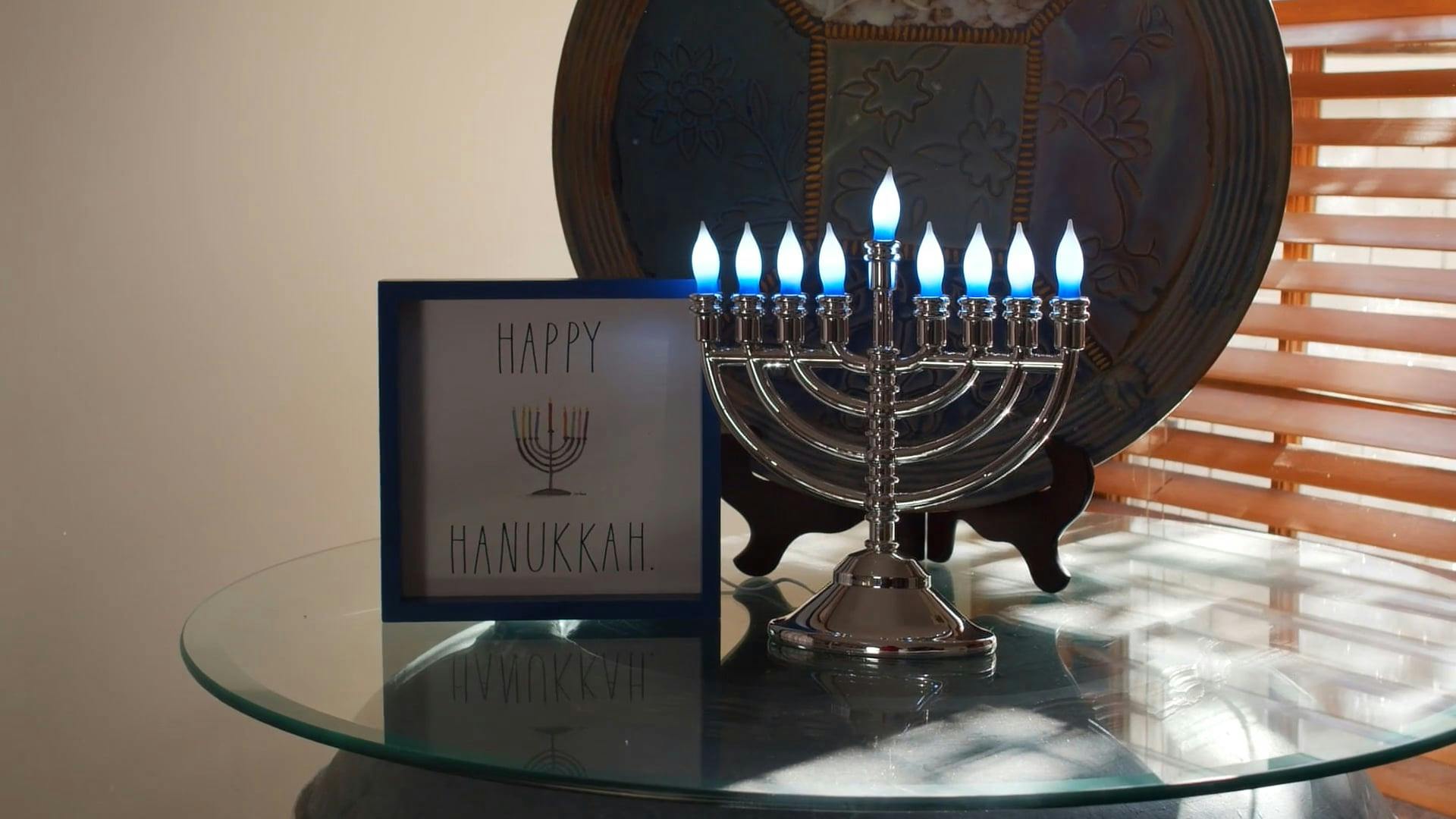 A Happy Hanukkah Display And Menorah On Table Free Stock Video Footage ...