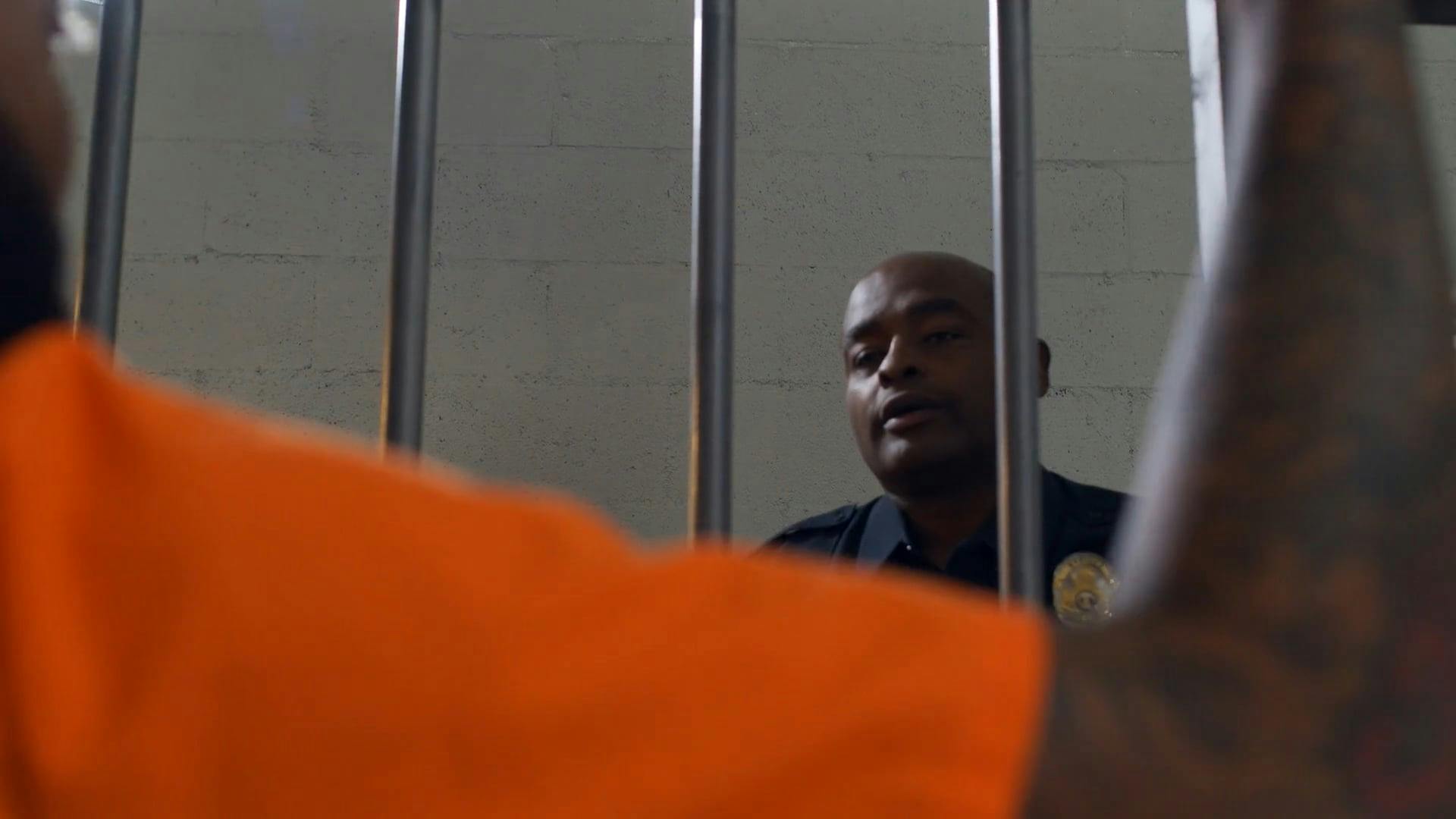 Policeman Talking to an Inmate · Free Stock Video