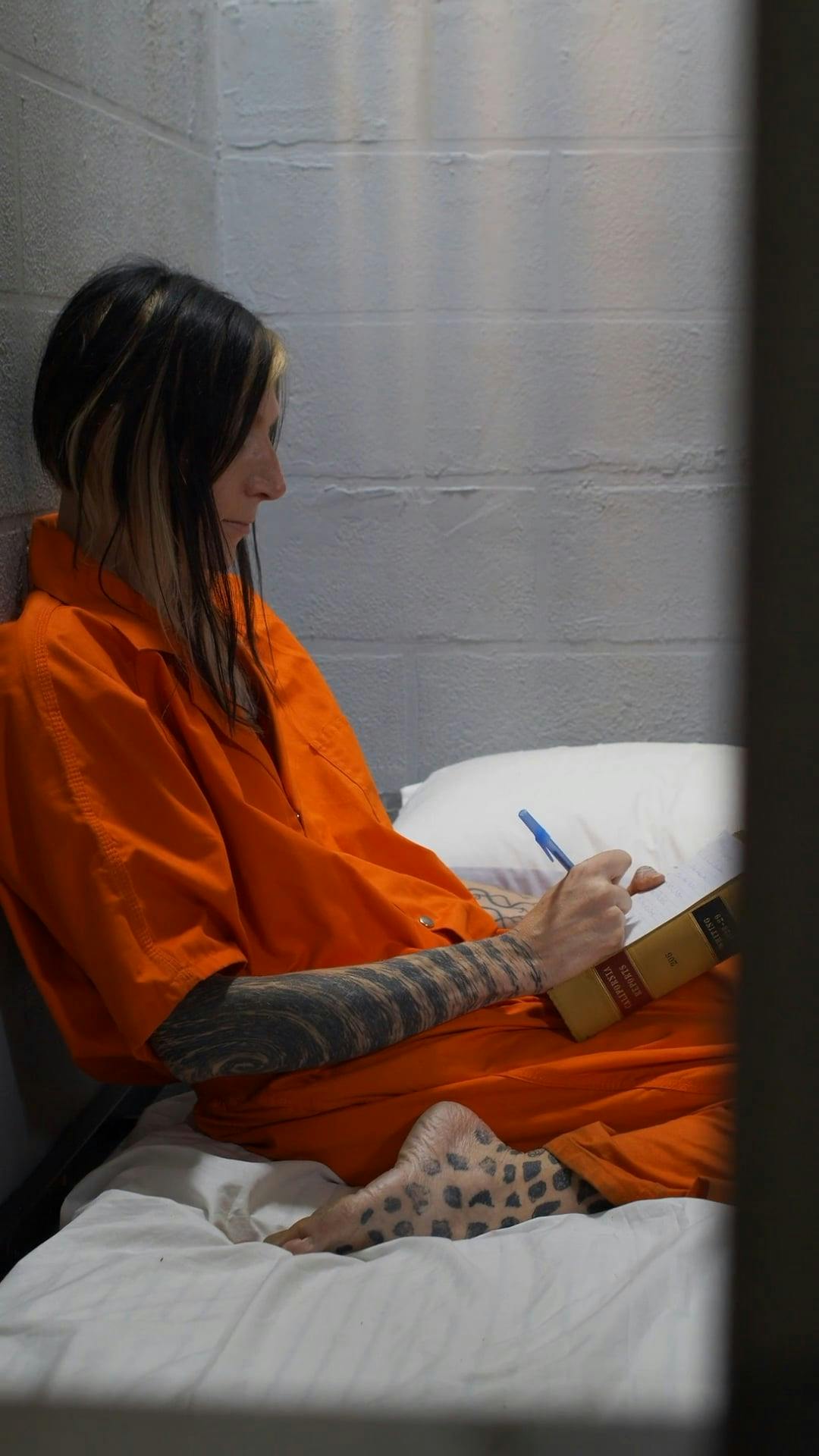 Prisoner Writing in Paper · Free Stock Video