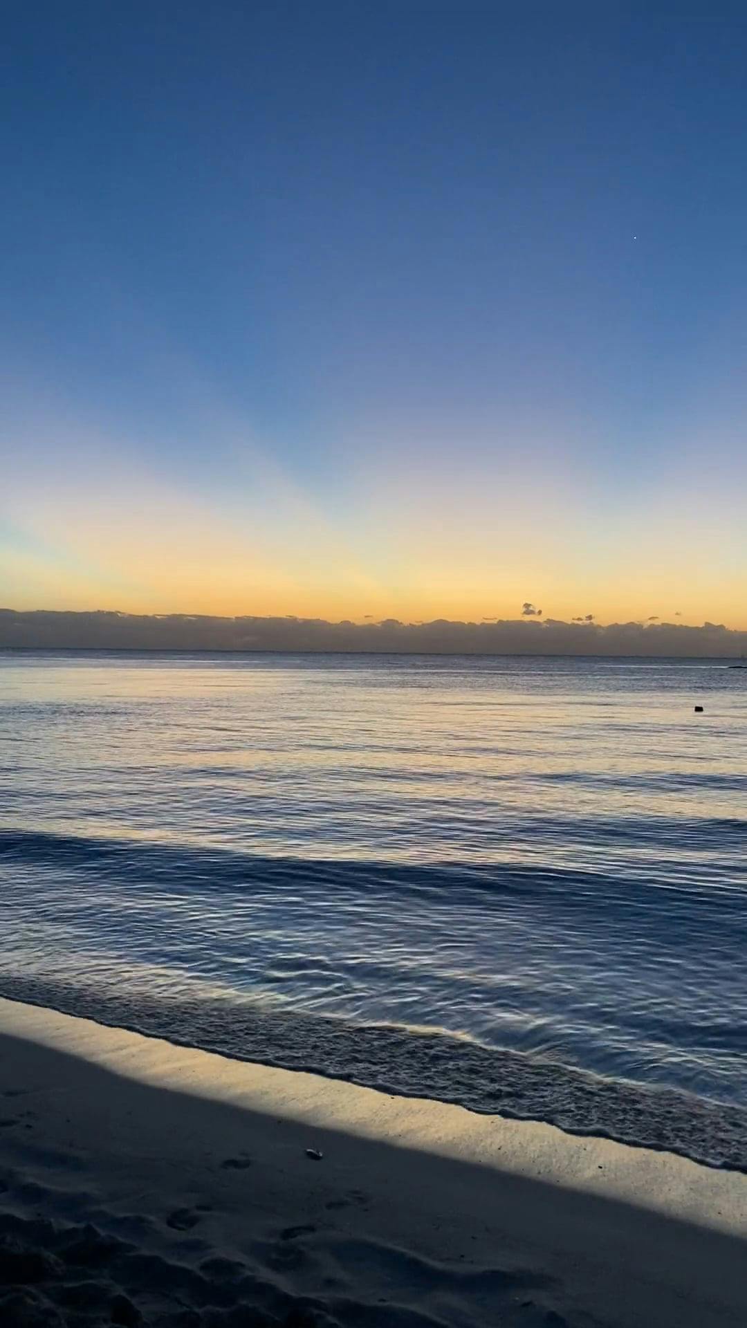 Sunset on Peaceful Beach · Free Stock Video