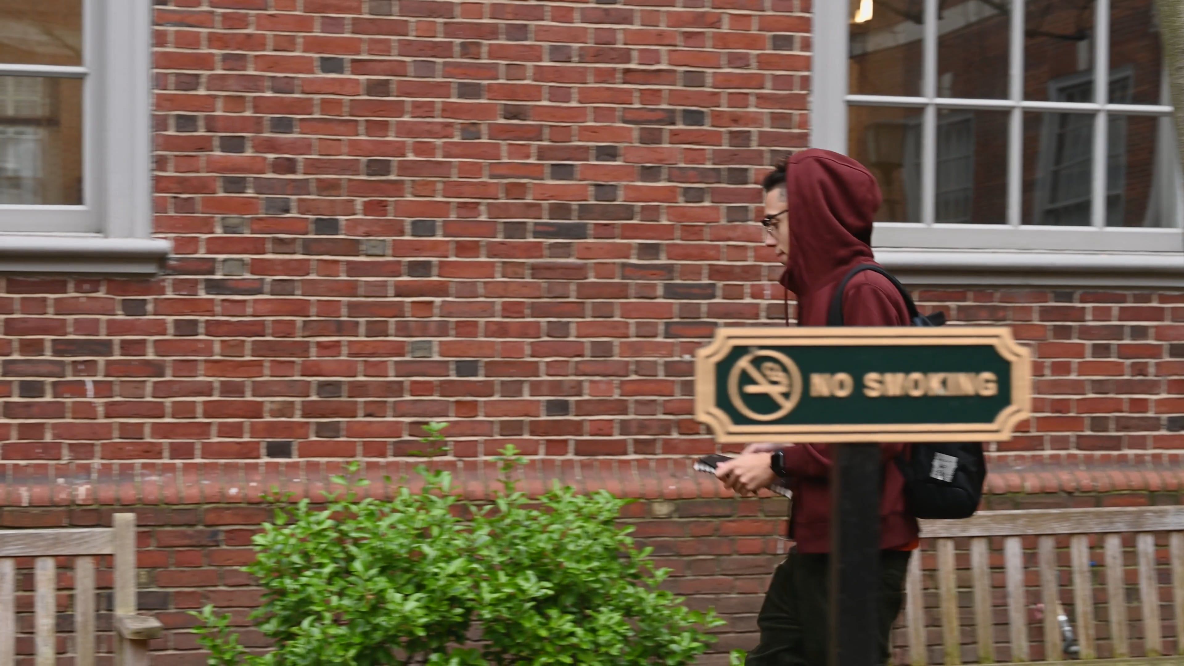 A Man Sitting on a Bench and Writing on a Book Free Stock Video Footage ...