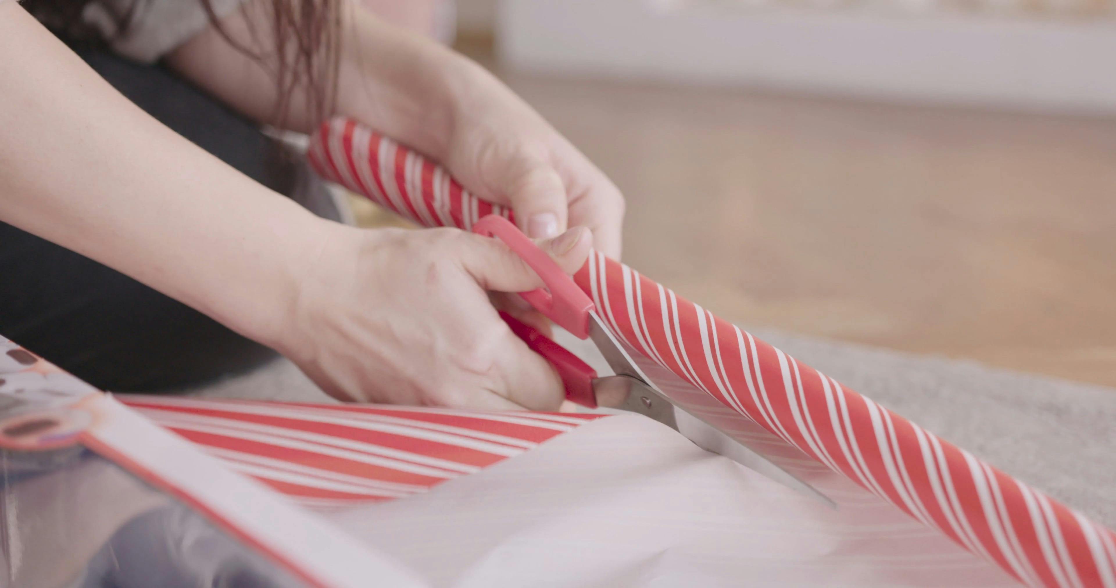 A Woman Cutting A Gift Wrapper Free Stock Video Footage, Royalty-Free ...