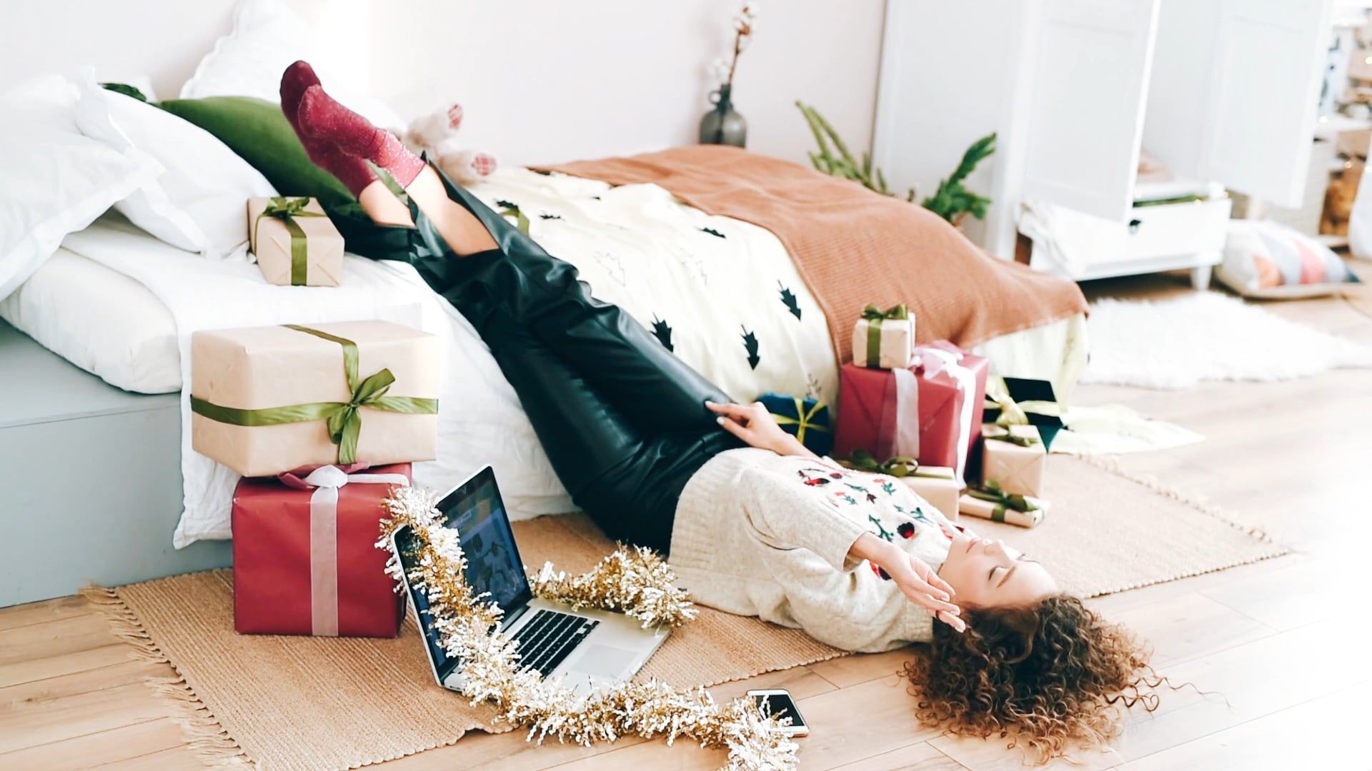 Bored Guy Reading a Book on Christmas · Free Stock Video