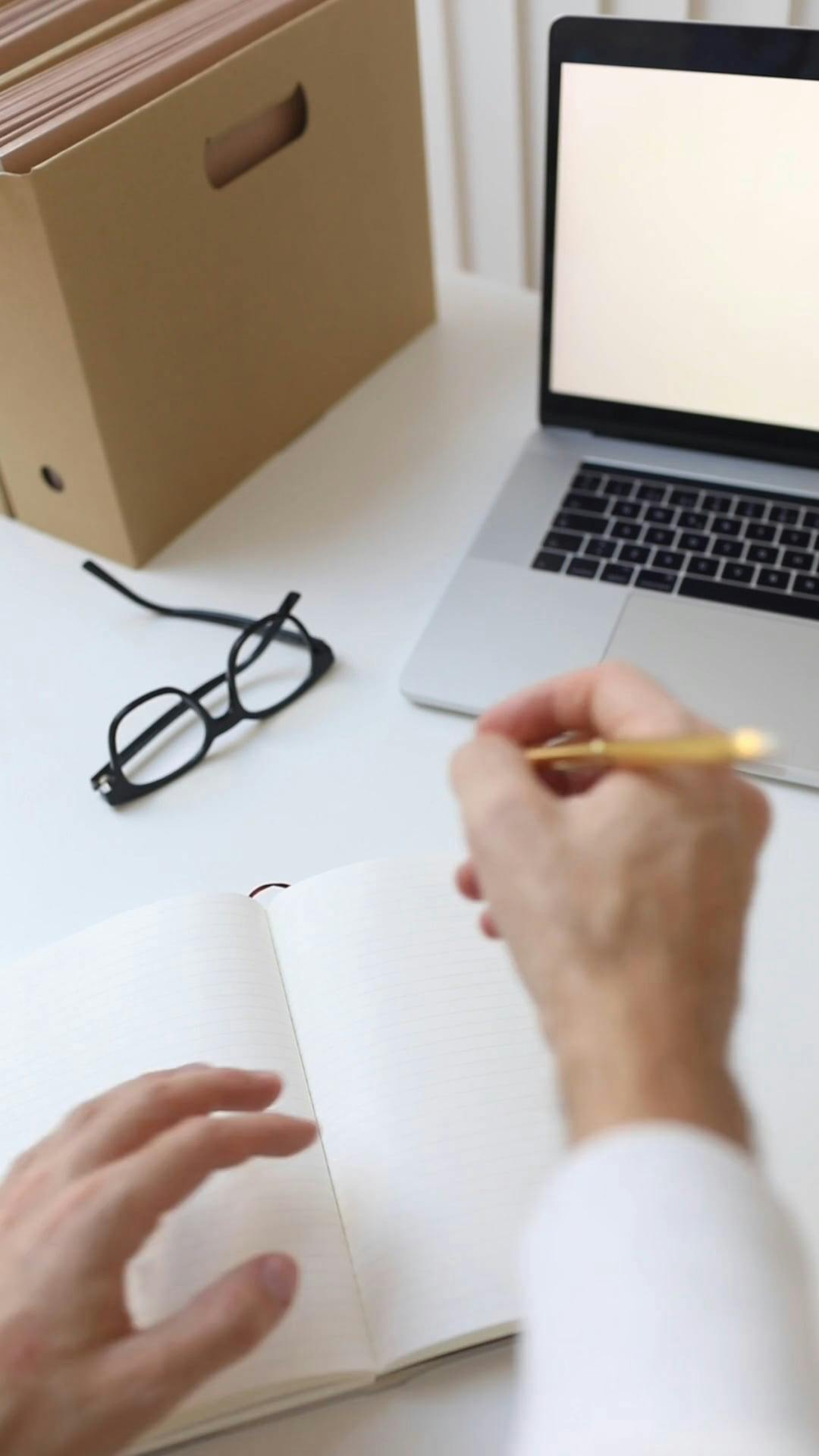 Faceless Person Taking Notes in Front of Computer Free Stock Video ...