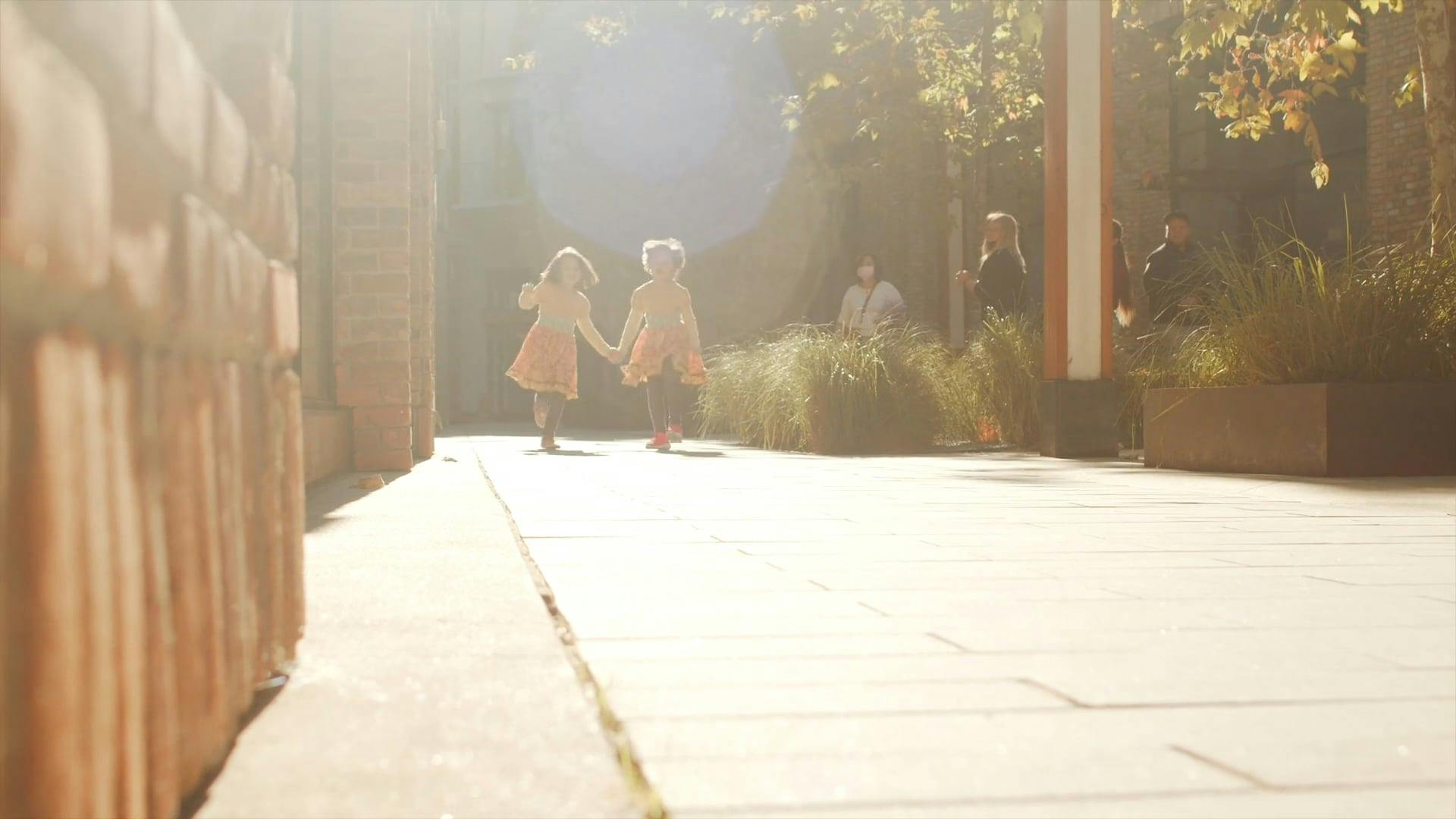 Sisters Hopping Together while Holding Hands · Free Stock Video