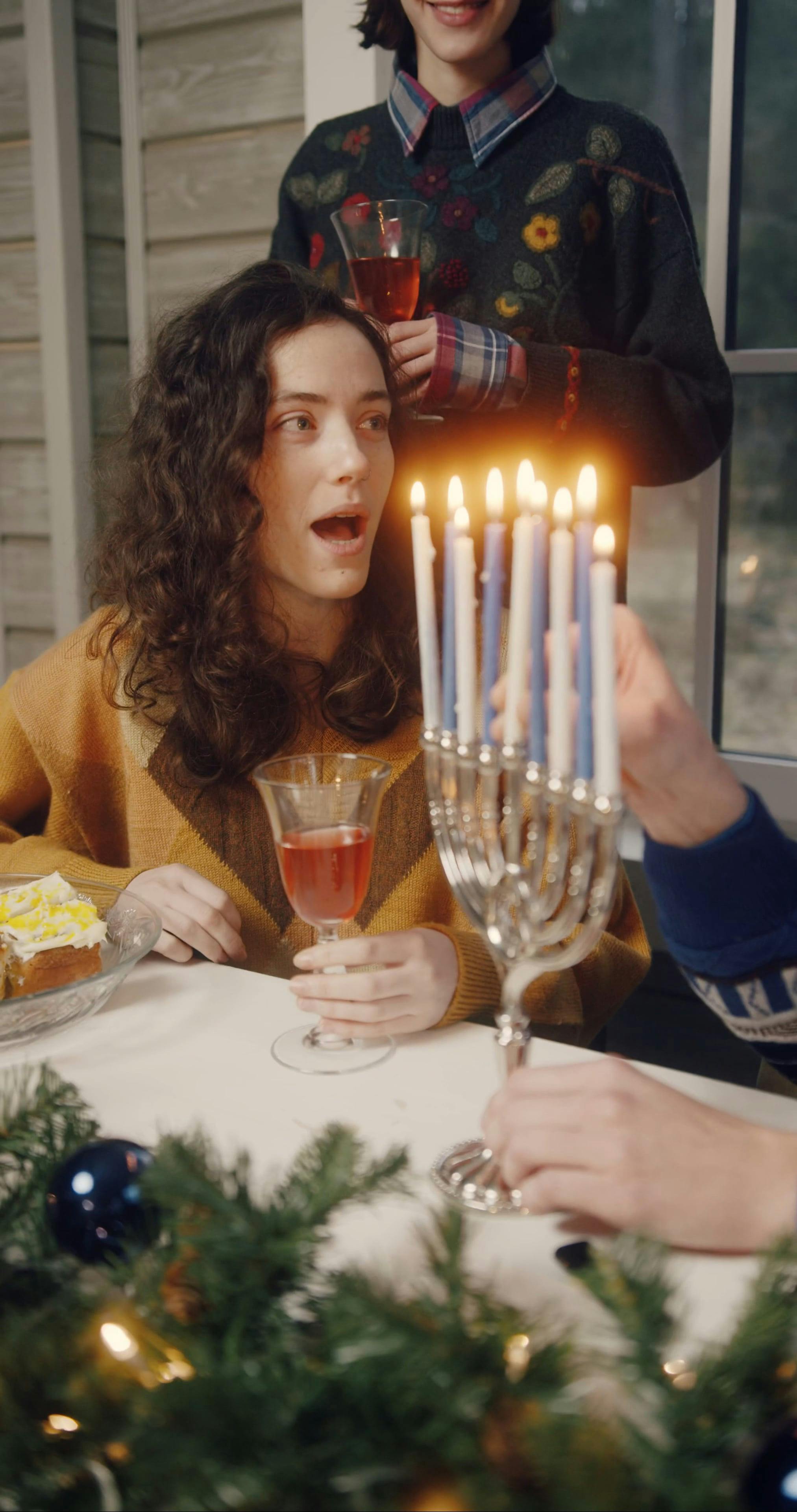 Jewish Friends Posing With Hanukkah Menorah In A Cabin House Free Stock ...