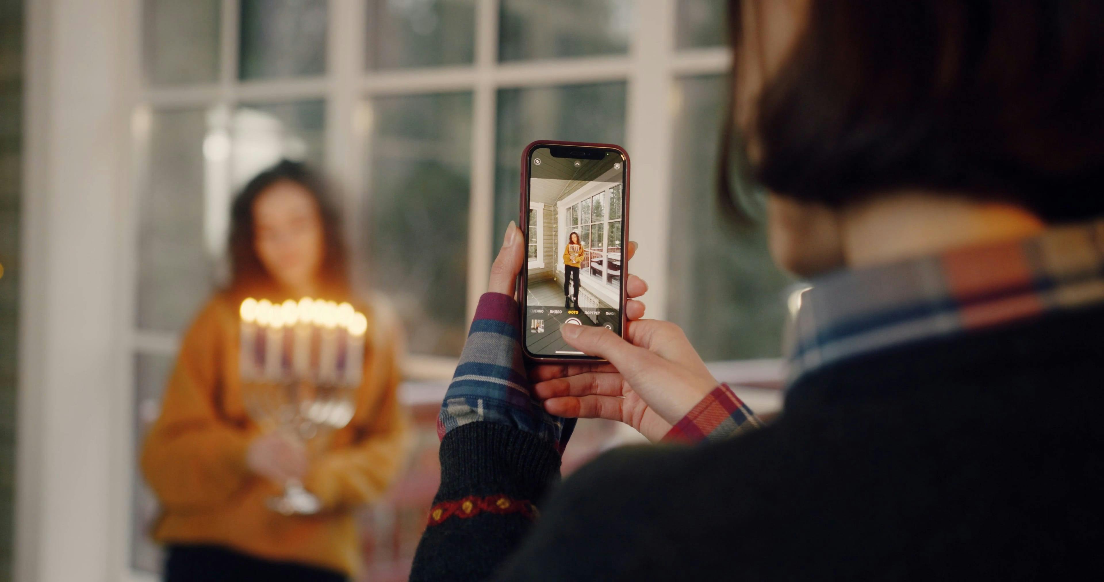 Jewish Friends Posing With Hanukkah Menorah In A Cabin House Free Stock ...