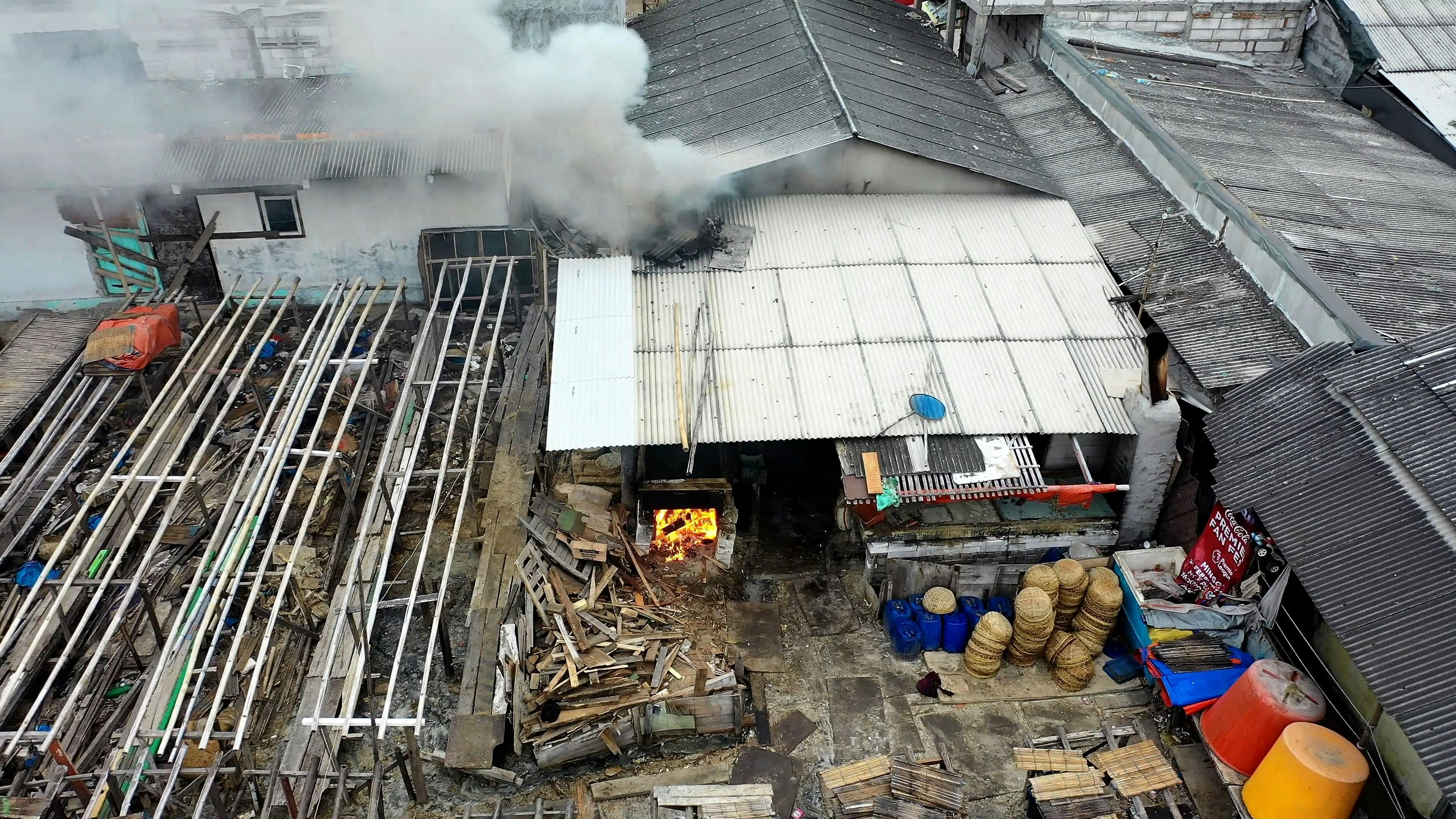 Aerial View of a Factory Emitting Smoke · Free Stock Video