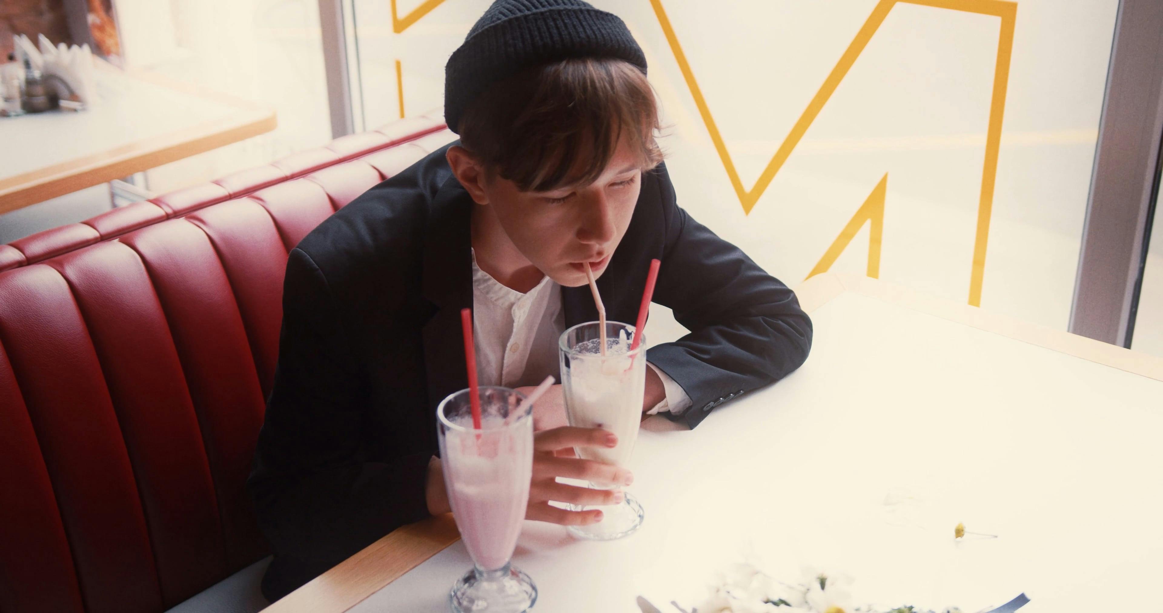 Man Drinking Milkshake While Sitting in the Cafe Free Stock Video ...