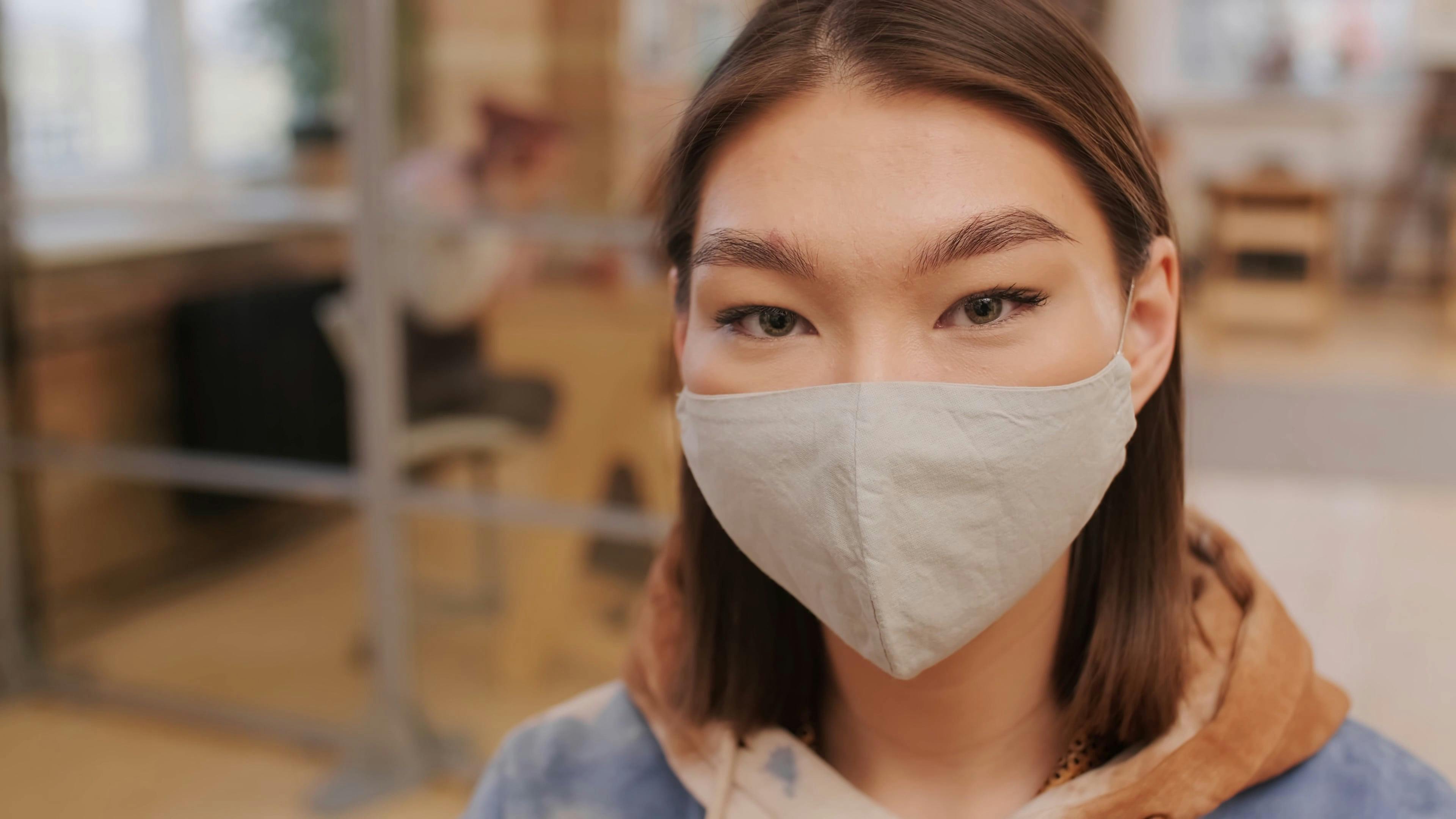 Close-up Shot of a Woman Wearing Face Mask · Free Stock Video