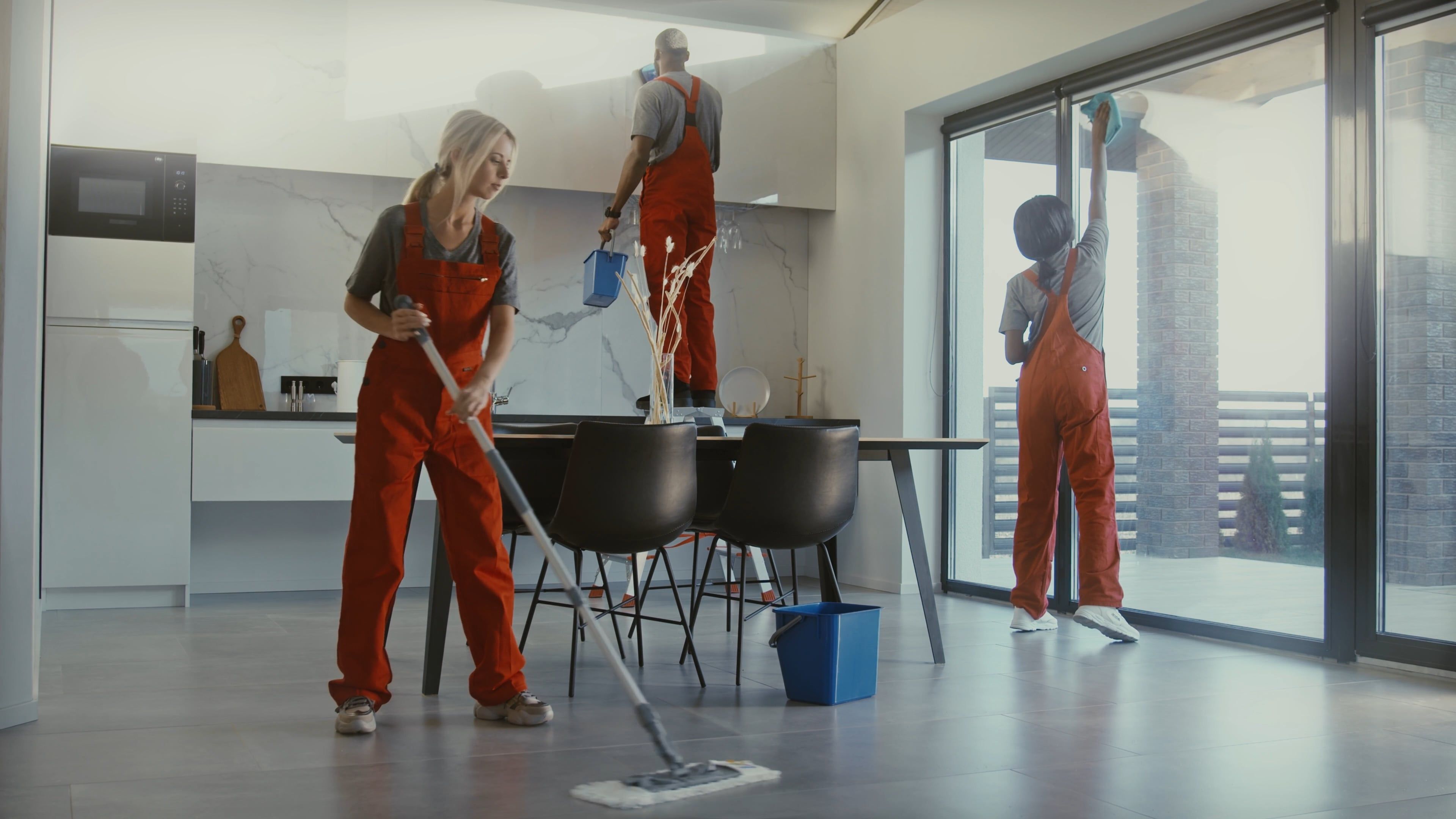 People in Overalls Cleaning Dining Area · Free Stock Video