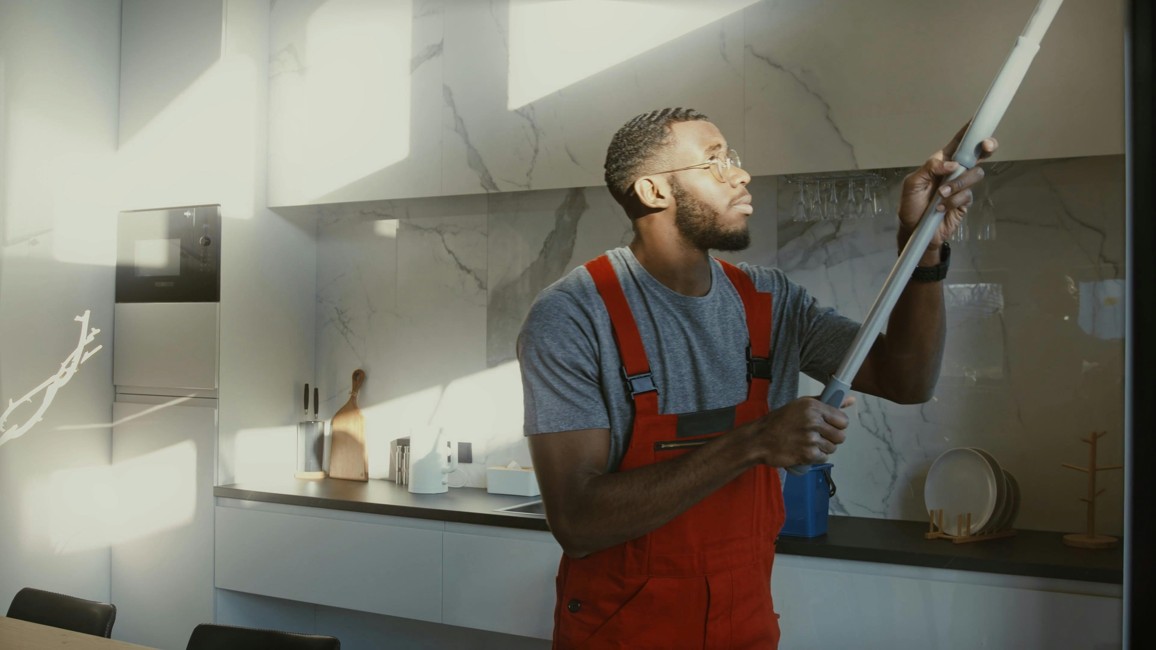 Man Wiping Window · Free Stock Video