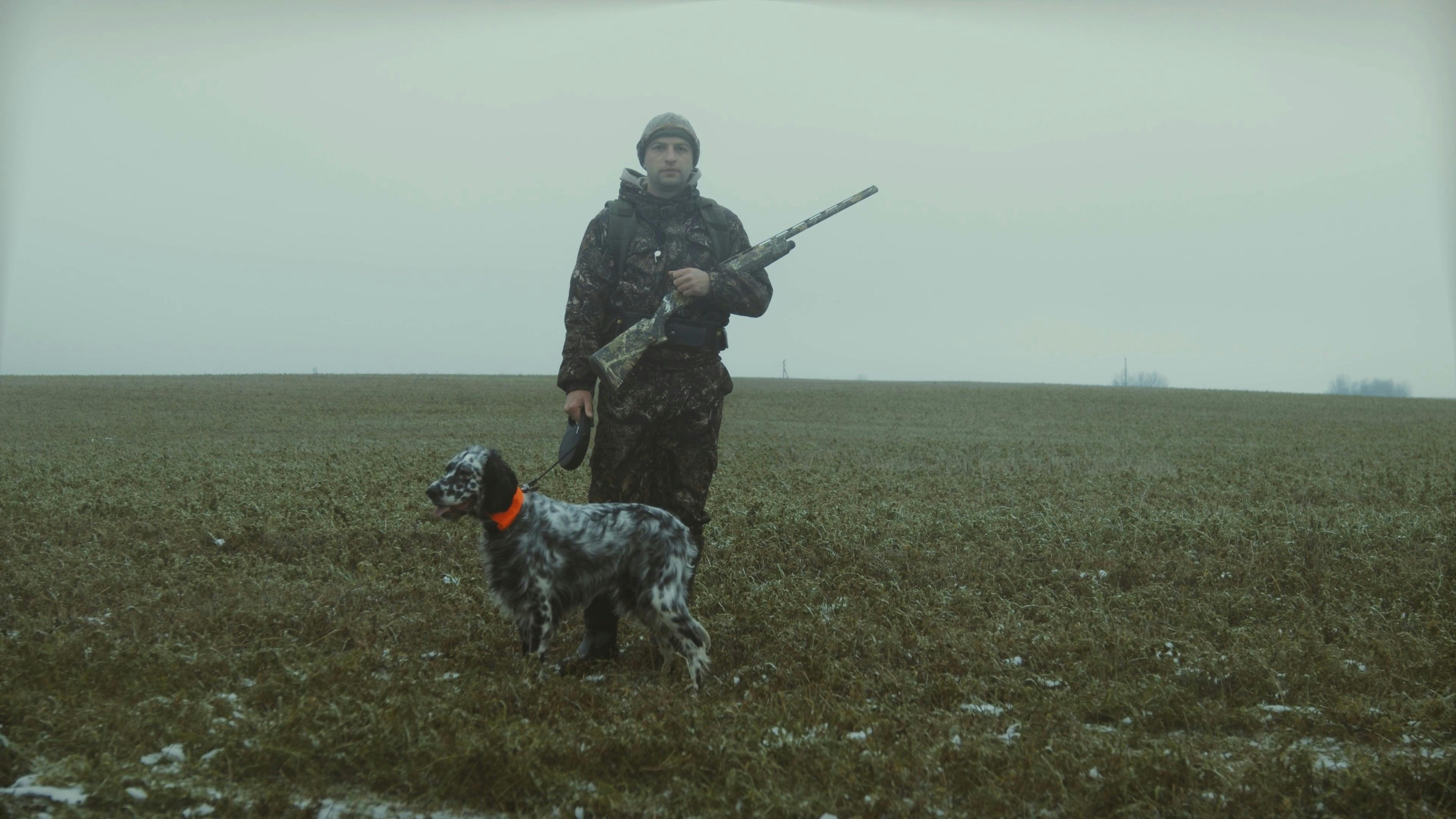 A Hunter Posing with his Dog and a Shotgun Free Stock Video Footage ...