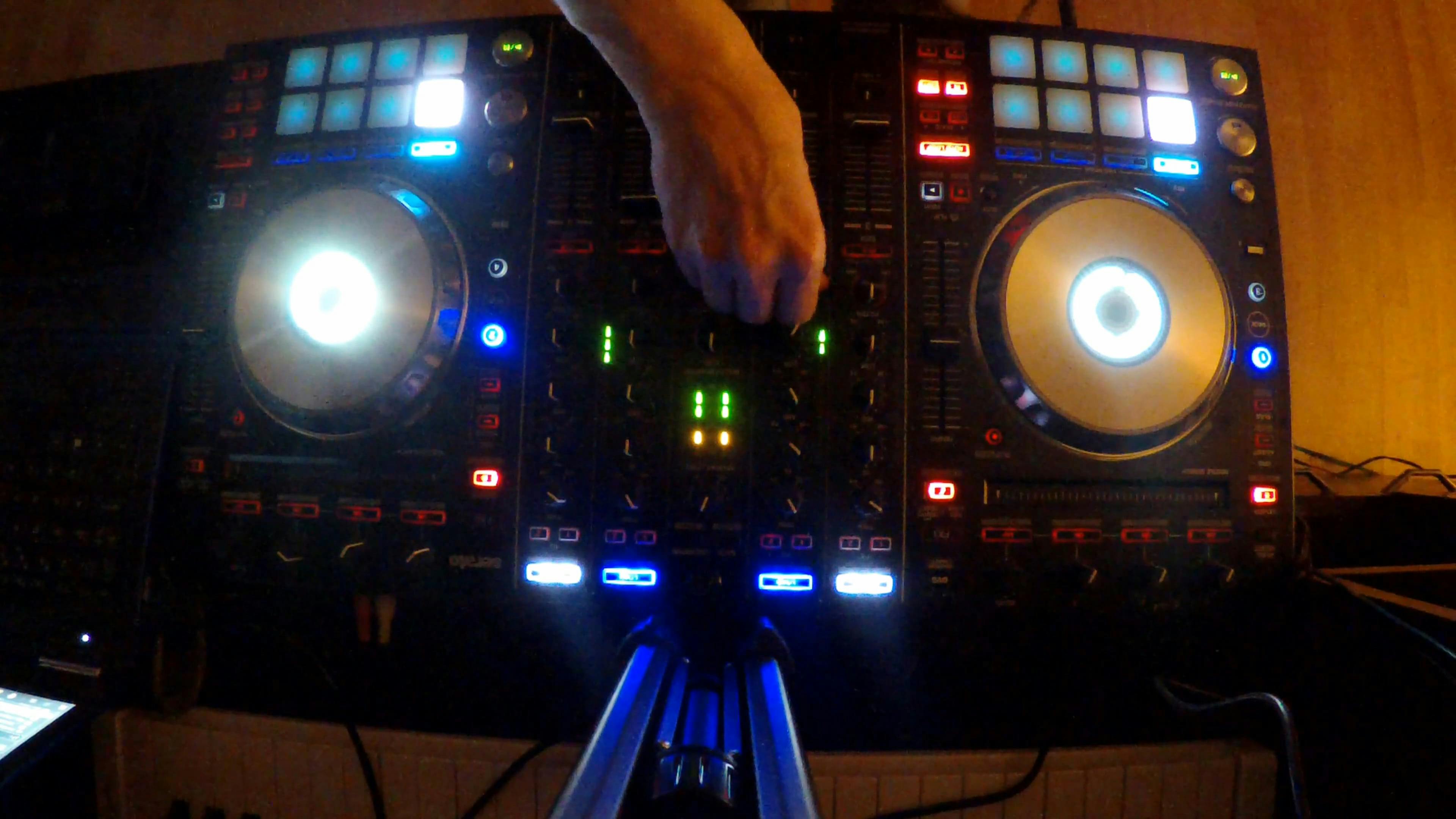 Close-up View Of A Dj's Turntable And Audio Mixer · Free Stock Video
