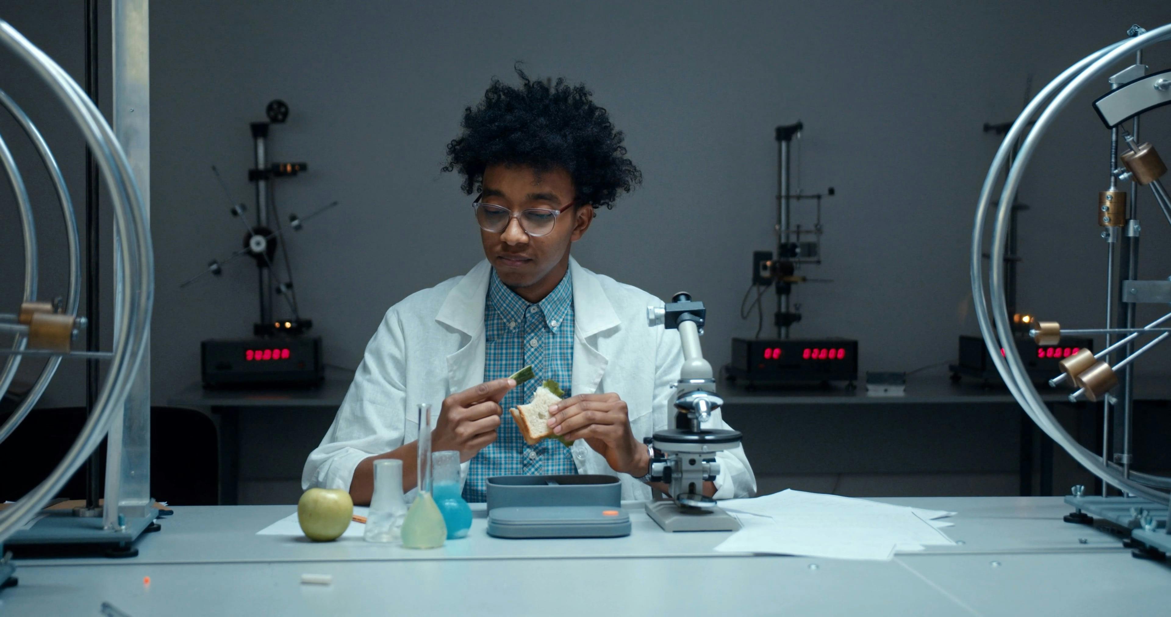 Young Man Observing His Experiments While Eating Free Stock Video ...