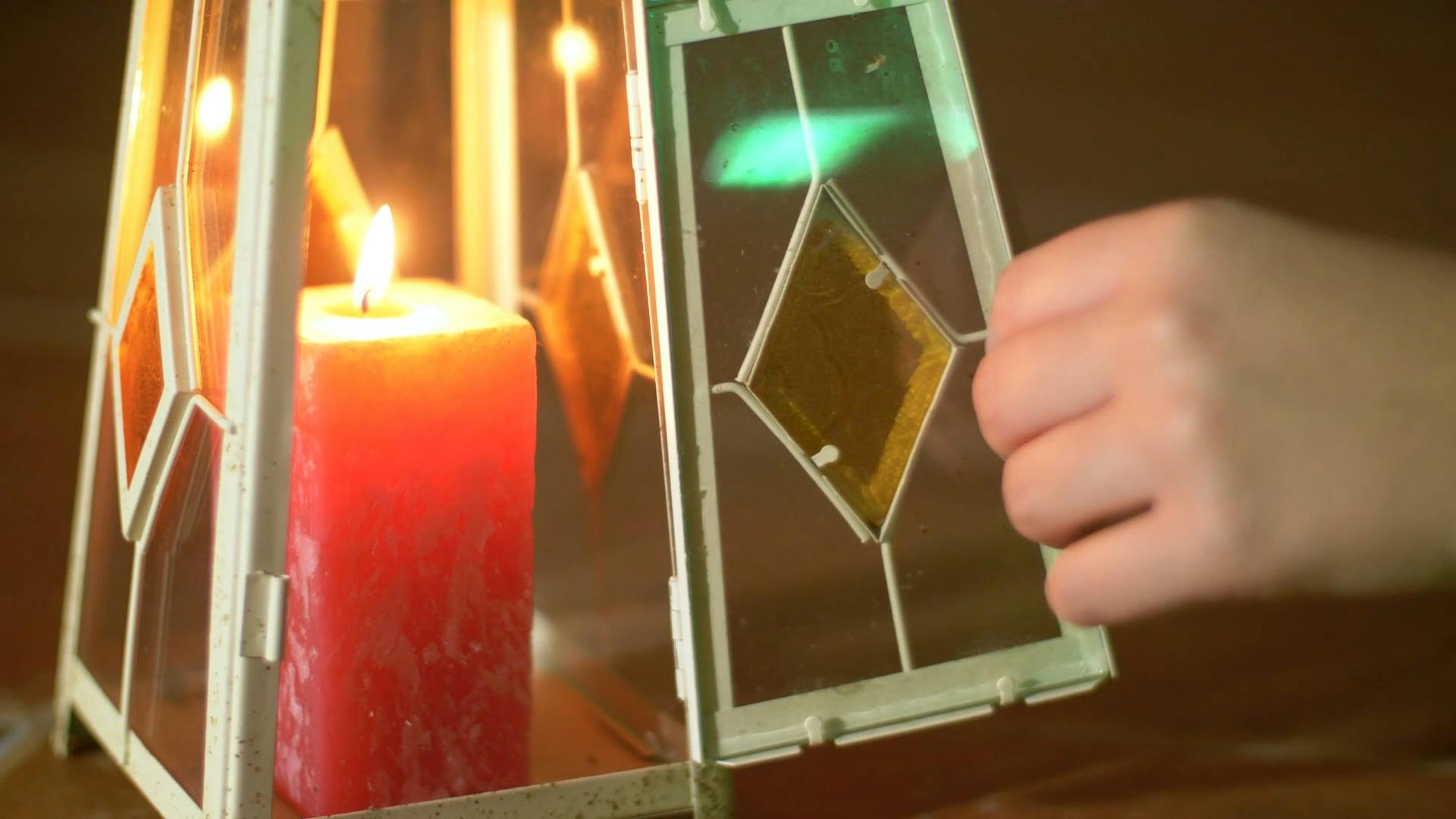 Person Closing a Candle Lamp Free Stock Video Footage, Royalty-Free 4K ...