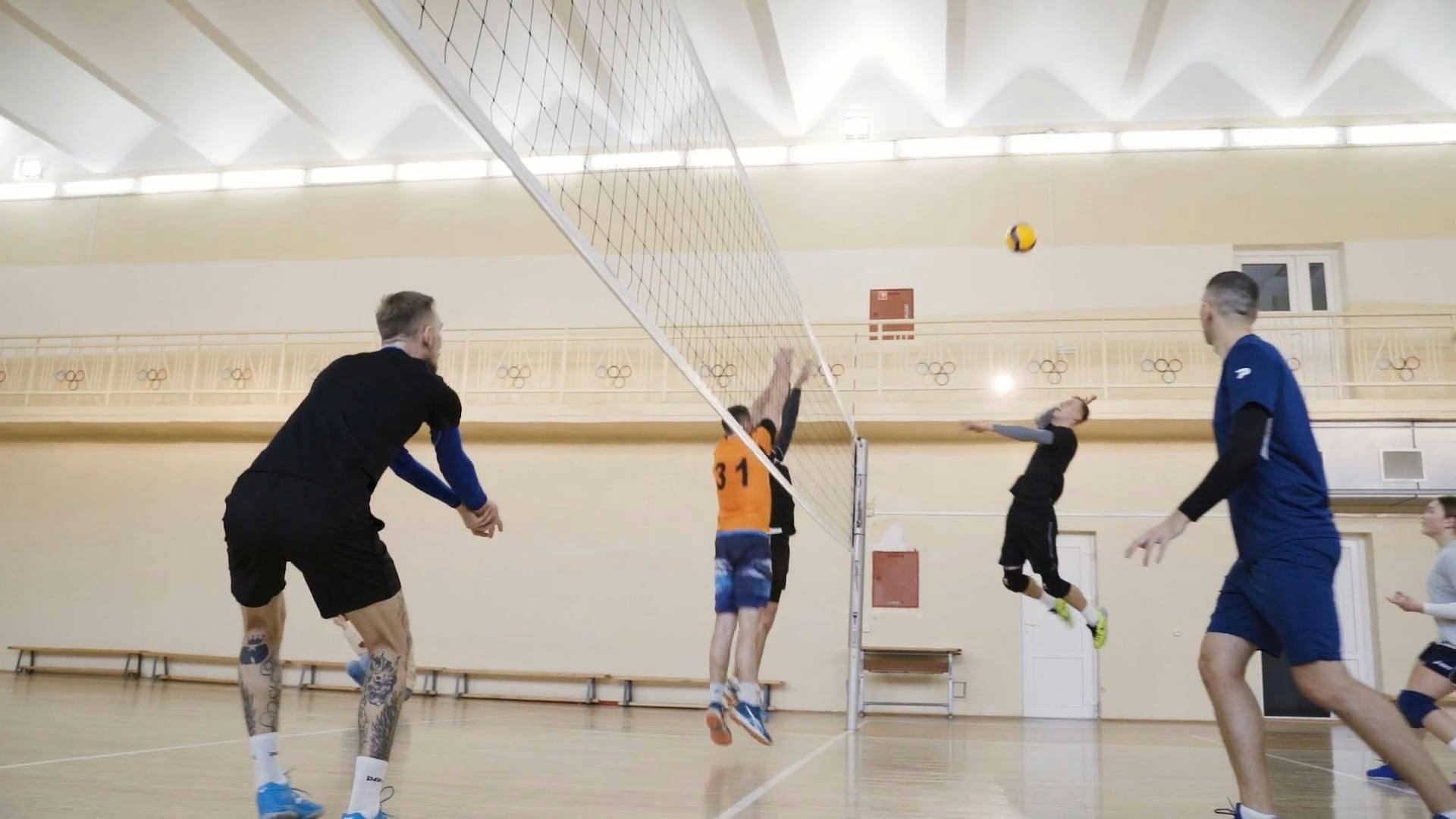 People Playing Volleyball in Gymnasium · Free Stock Video