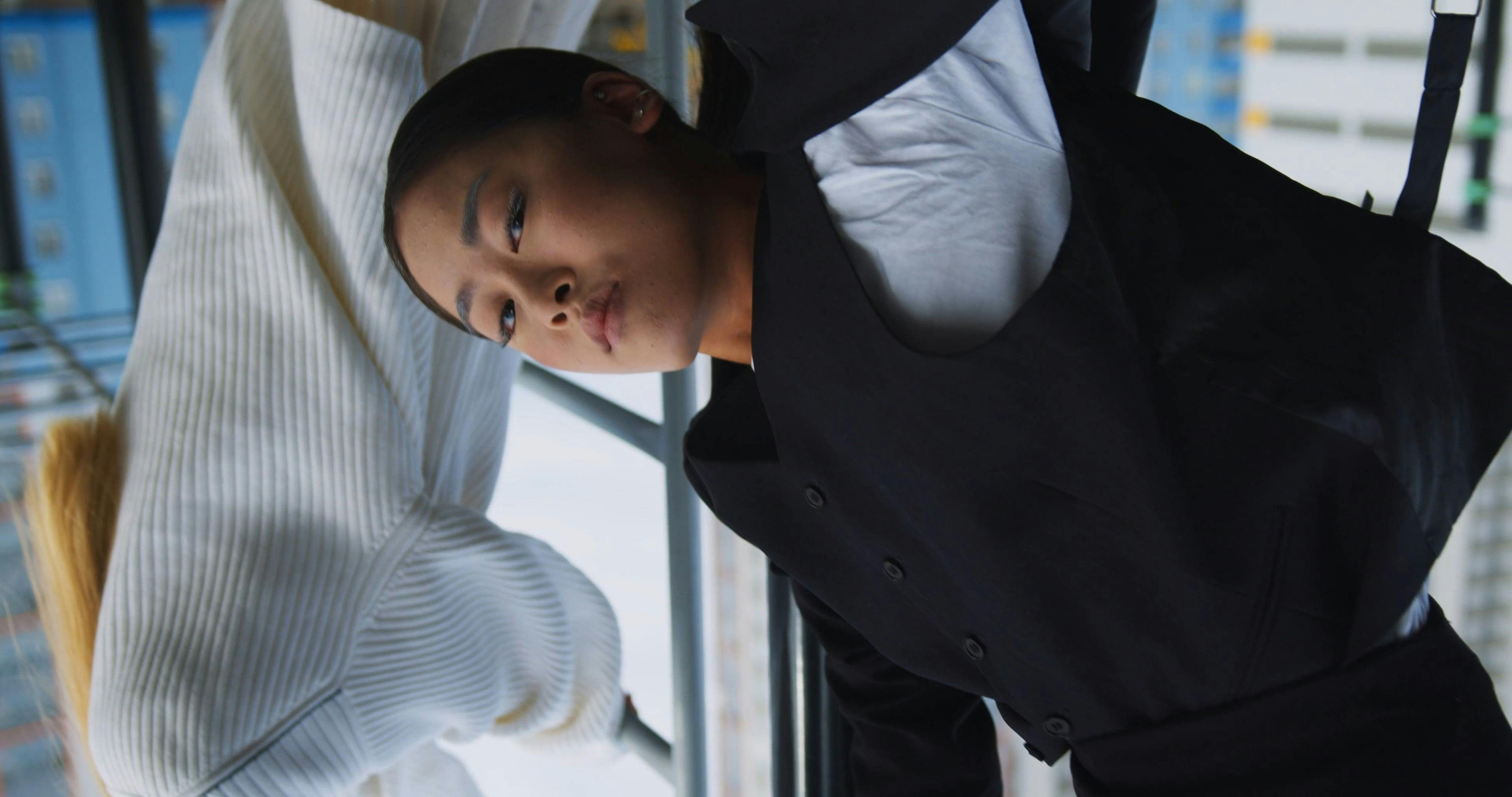 Female Models Hanging from Monkey Bars · Free Stock Video