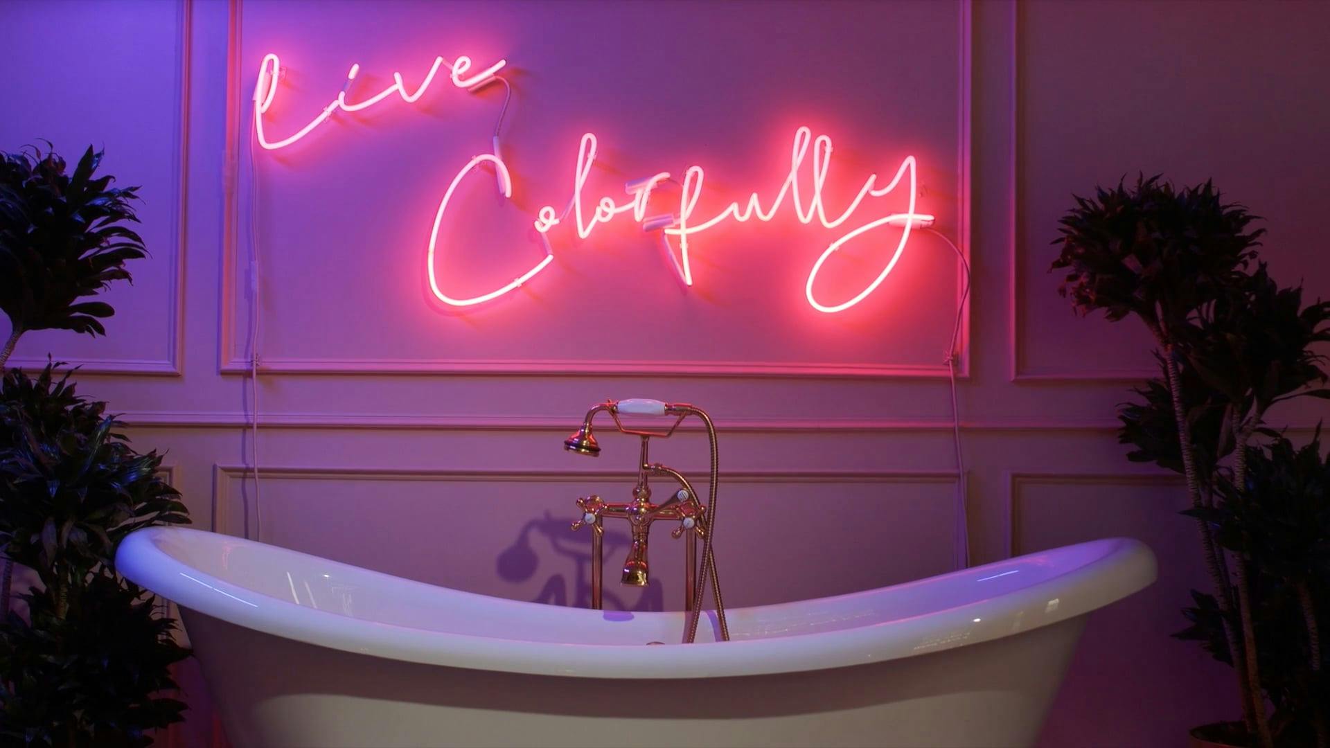 Bathtub with Neon Lights Sign Above · Free Stock Video