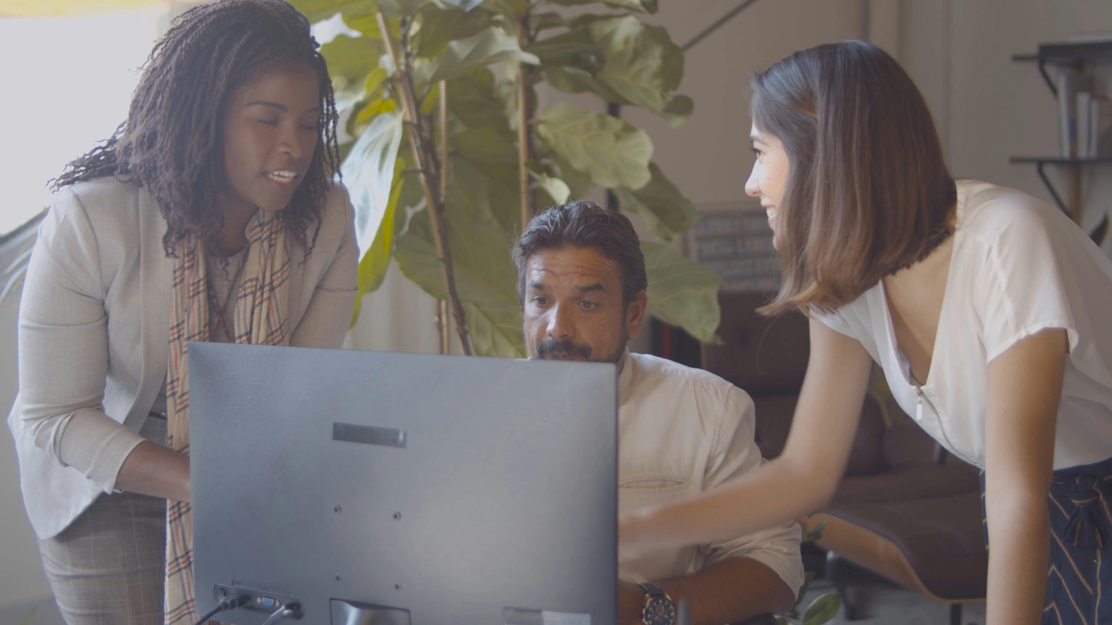People Looking a Monitor while Talking Together Free Stock Video ...