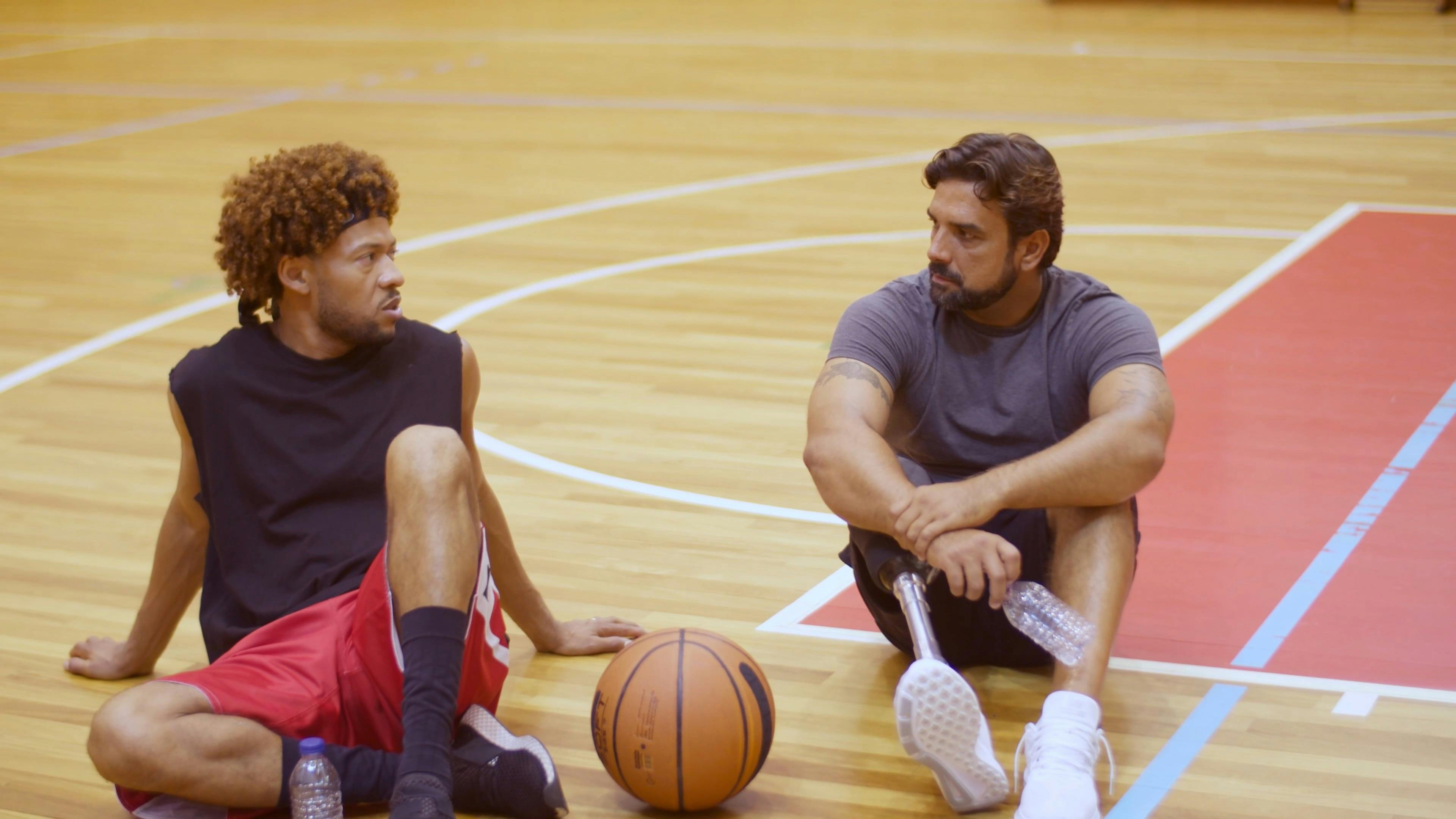 Men Seated On Basketball Courtyard While Talking Free Stock Video ...