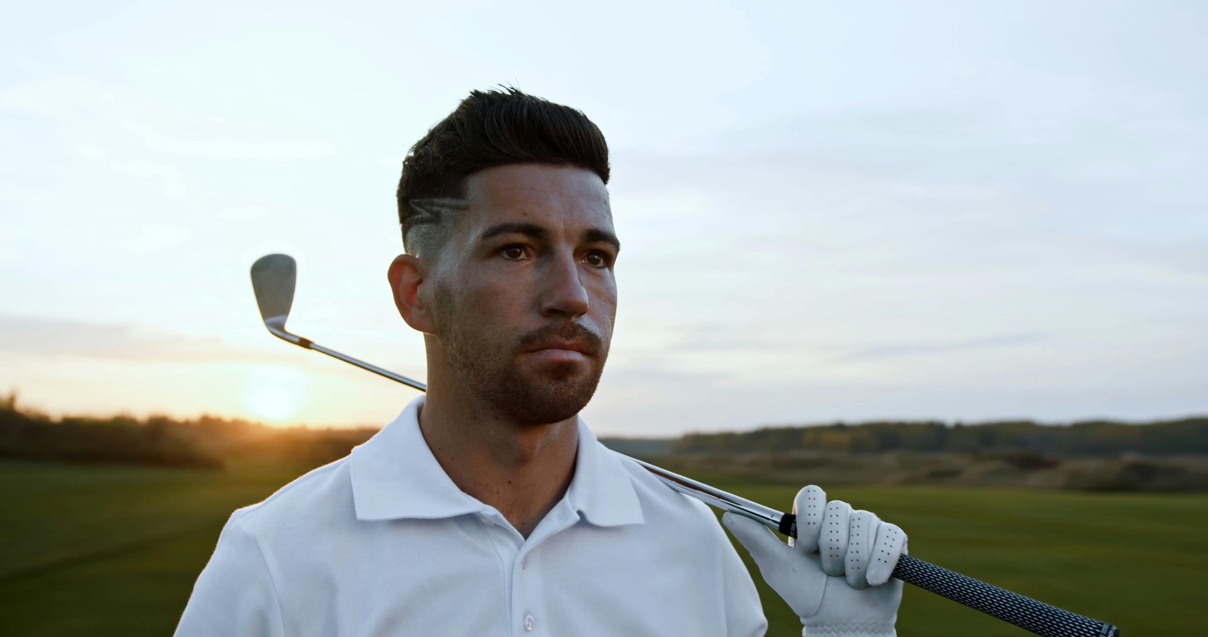 A Man Holding a Golf Club Free Stock Video Footage, Royalty-Free 4K ...