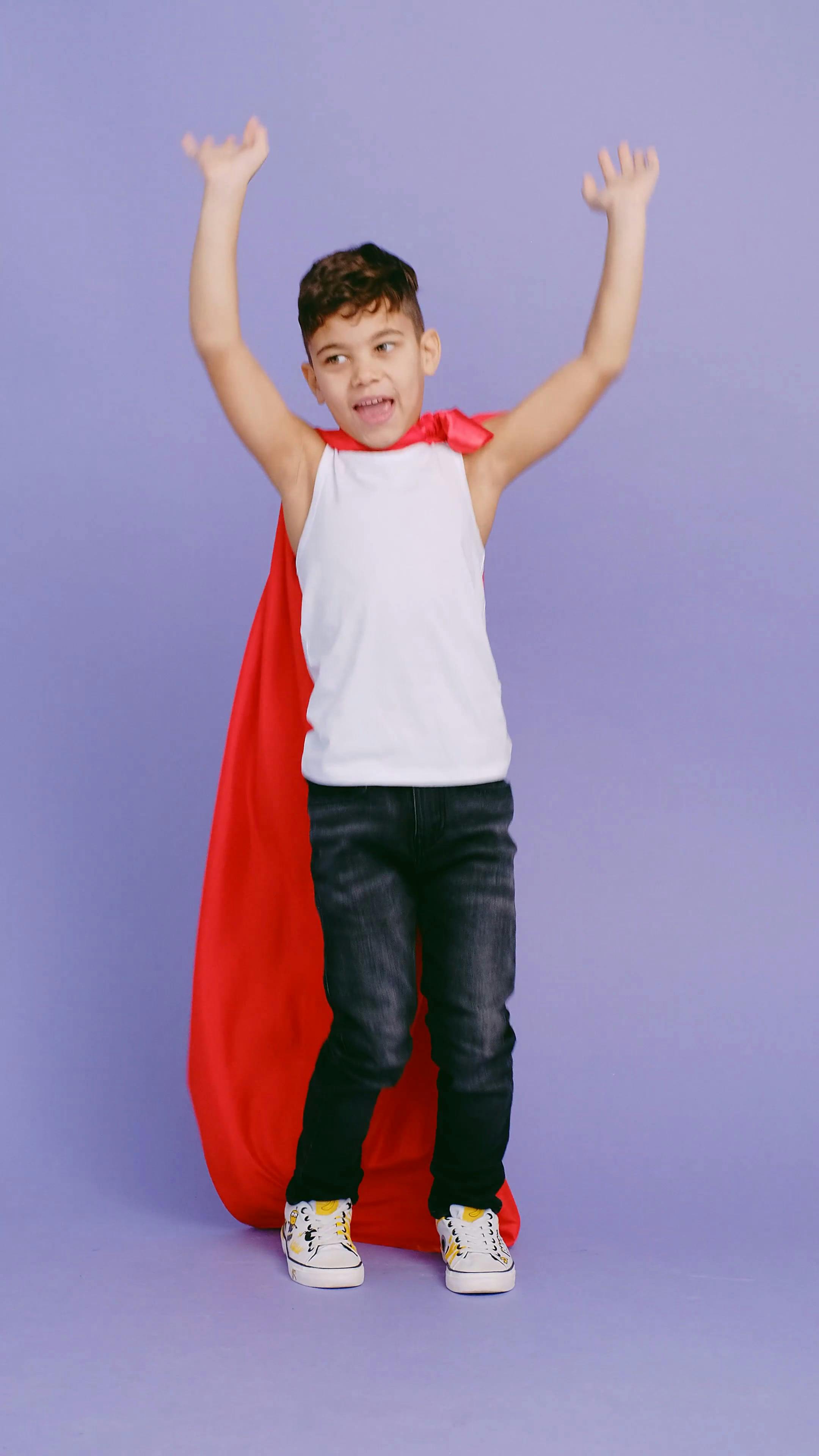 Boy Wearing a Cape Jumping · Free Stock Video