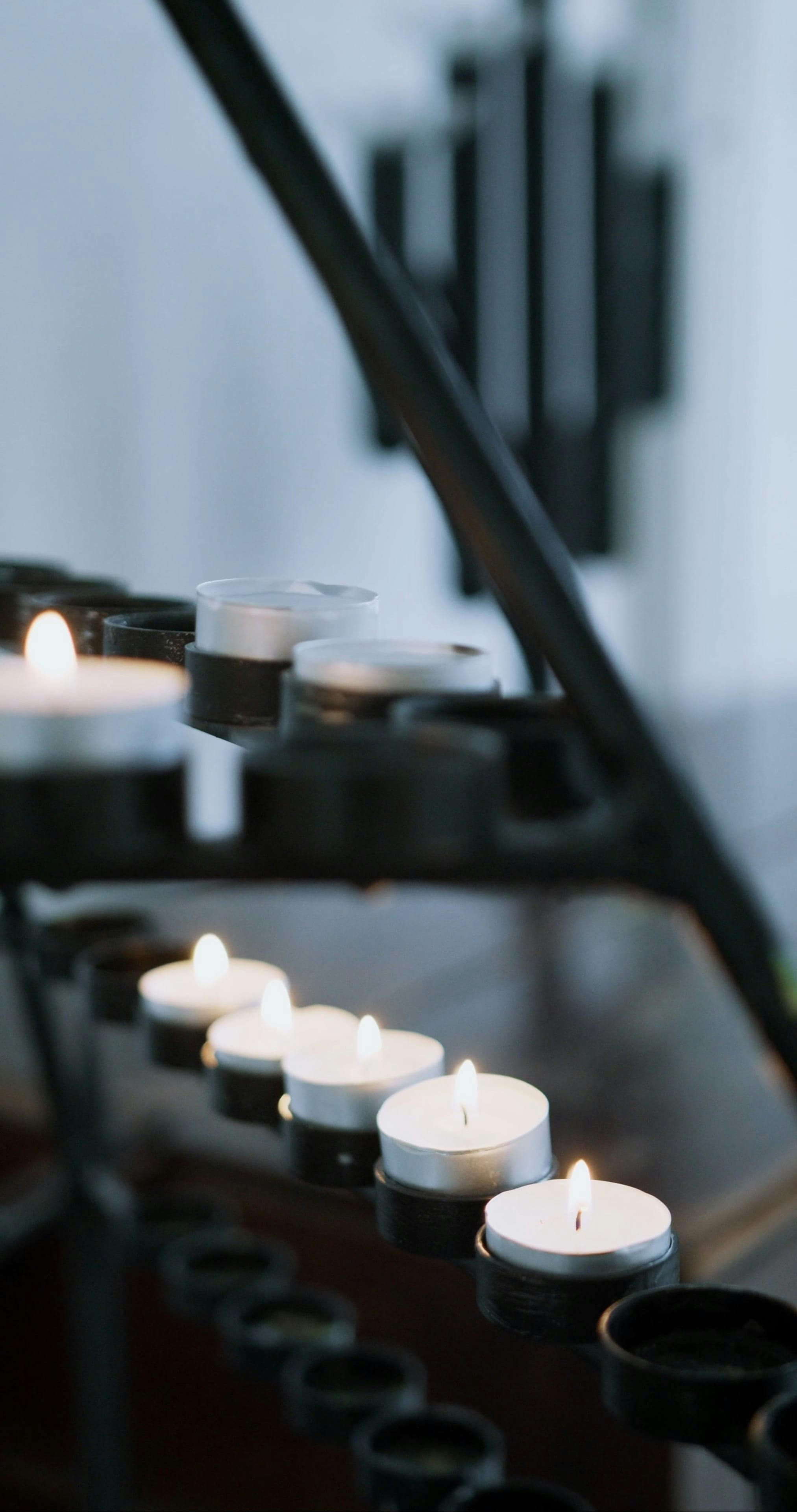 Person Lighting Up A Candle · Free Stock Video