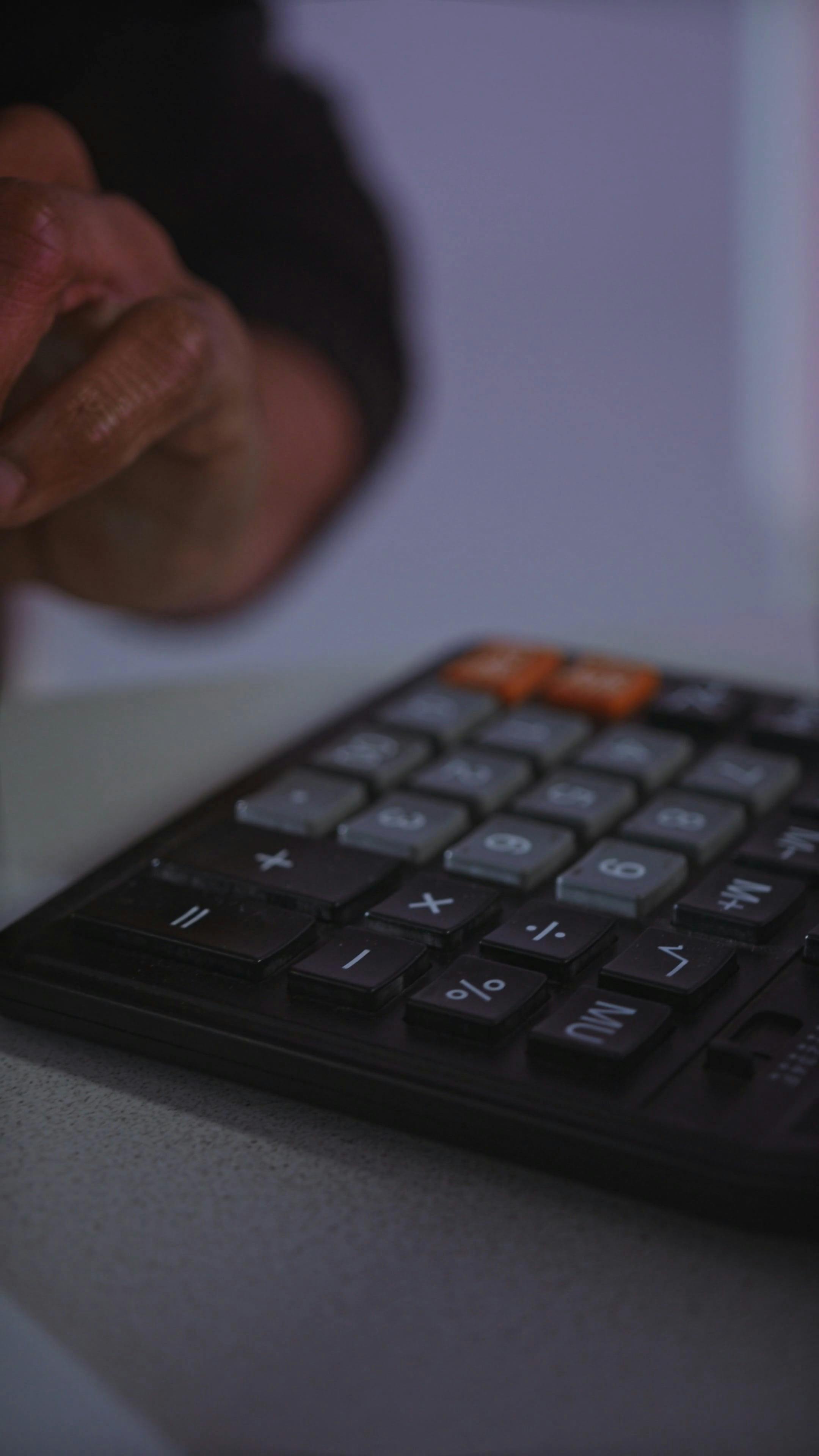 A Person Using a Calculator and Typing Free Stock Video Footage ...