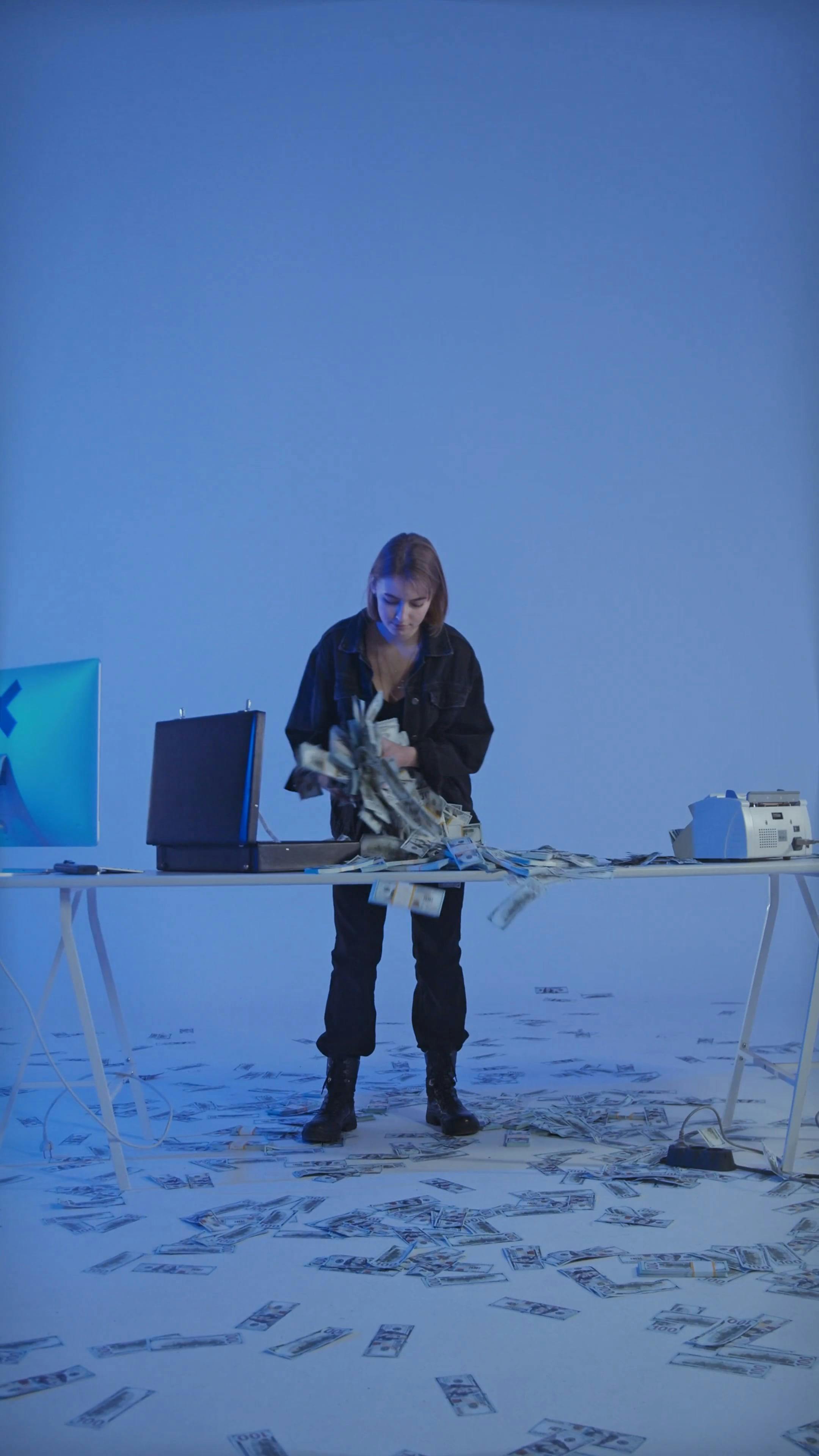 Man Using a Computer and a Woman Counting Money Free Stock Video ...
