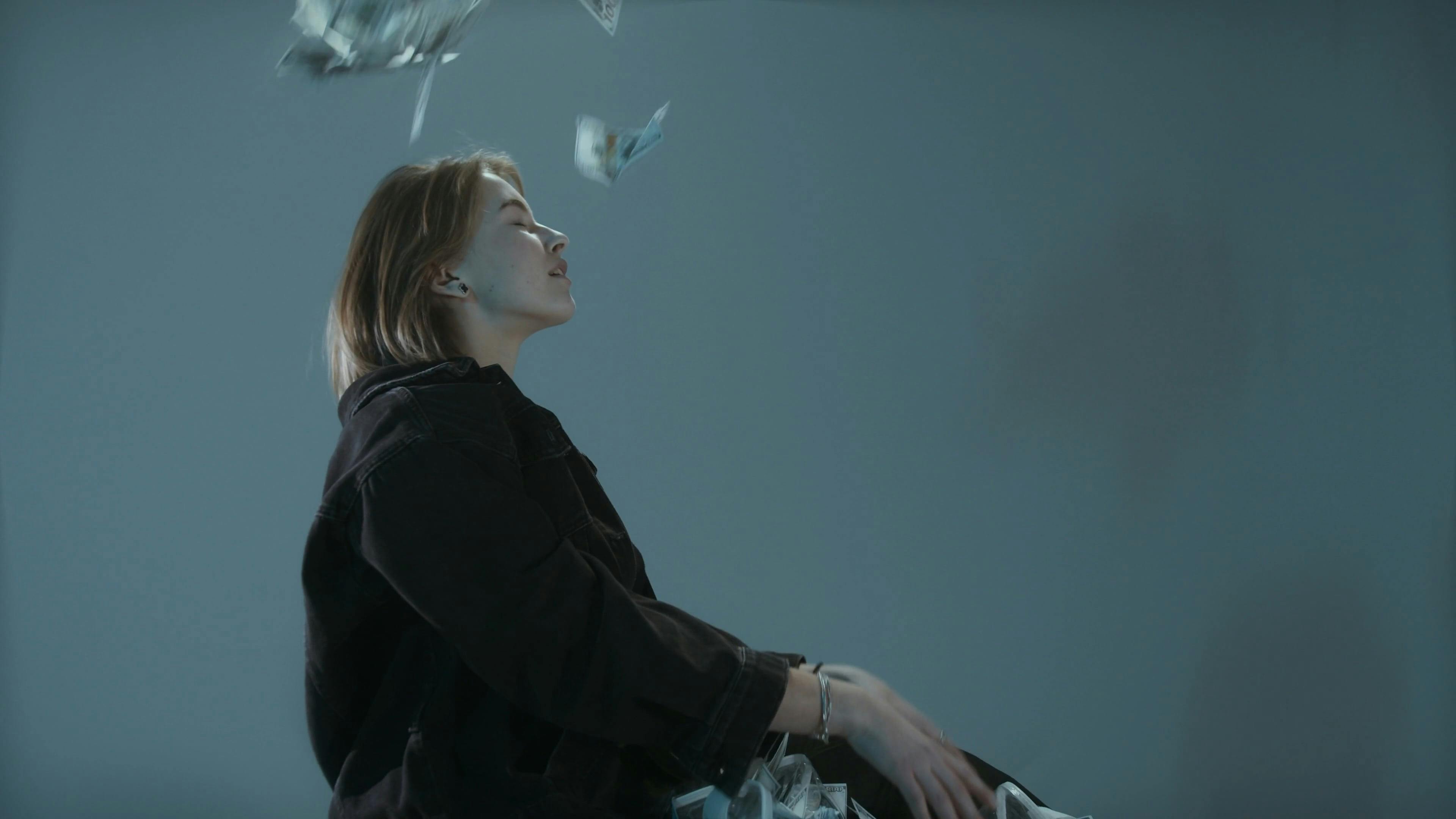 Woman in Black Clothes With a Pile of Money · Free Stock Video