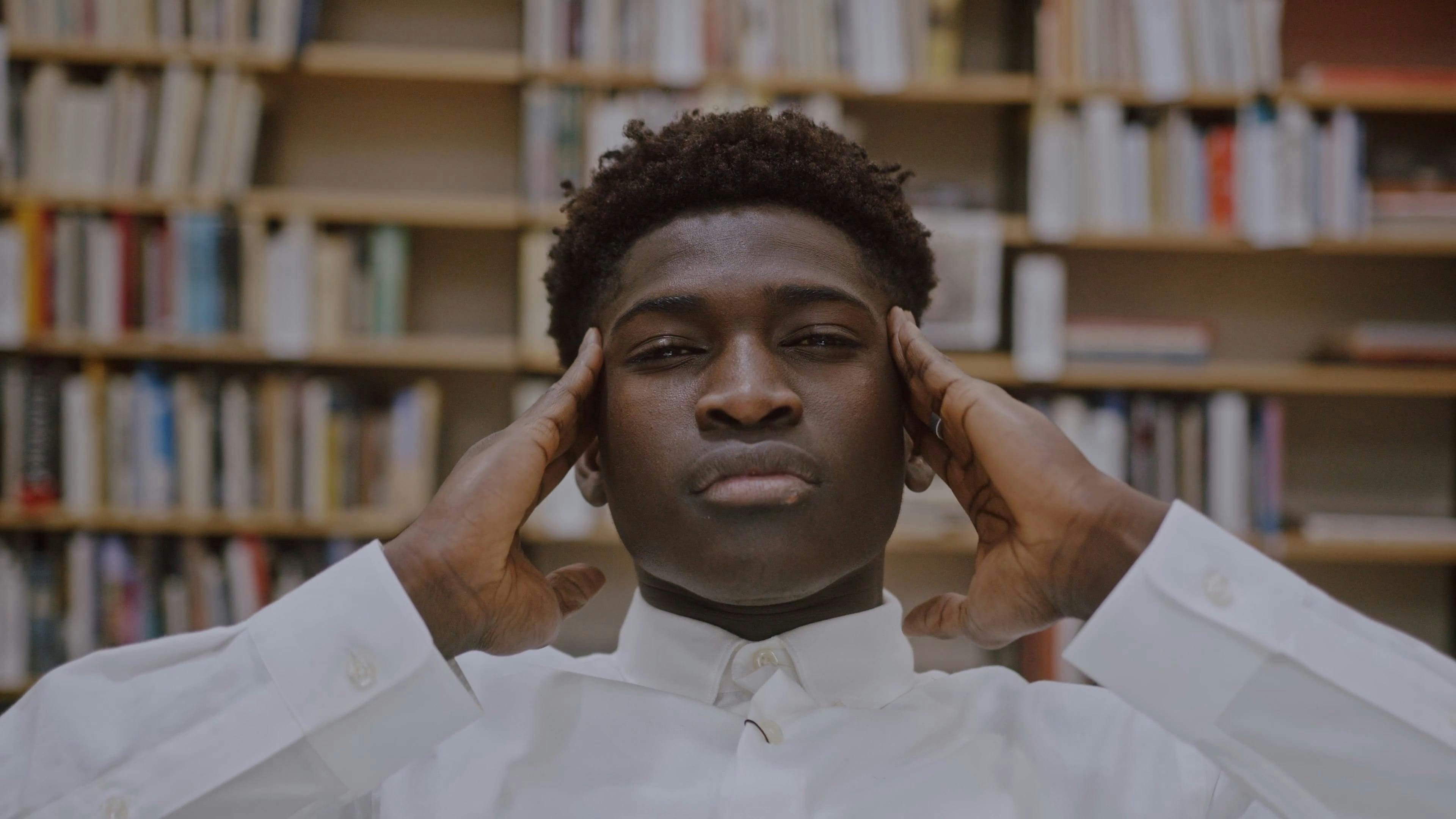 Young Man in a Library Free Stock Video Footage, Royalty-Free 4K & HD ...