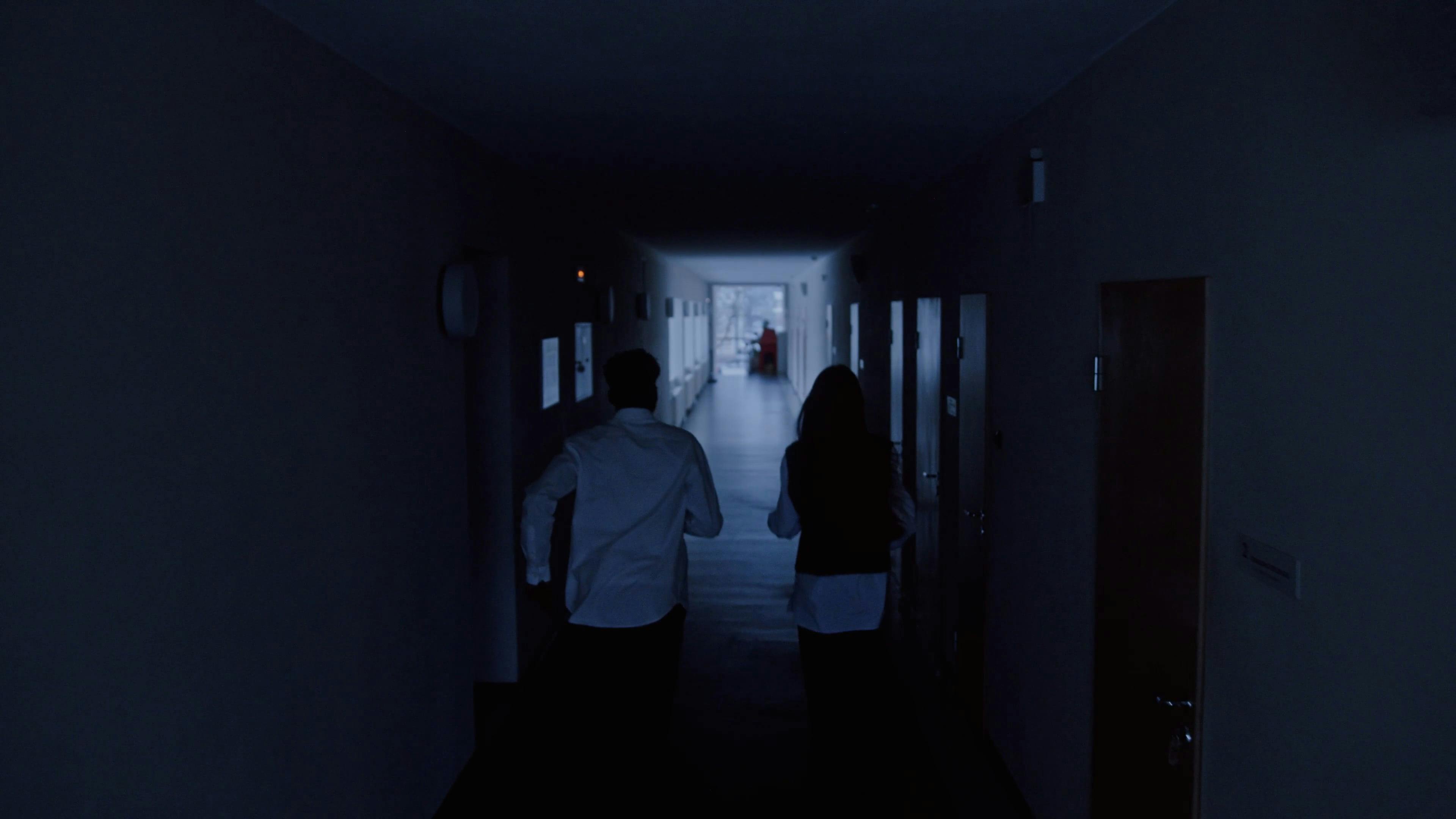A Man and Woman Running in the Hallway · Free Stock Video